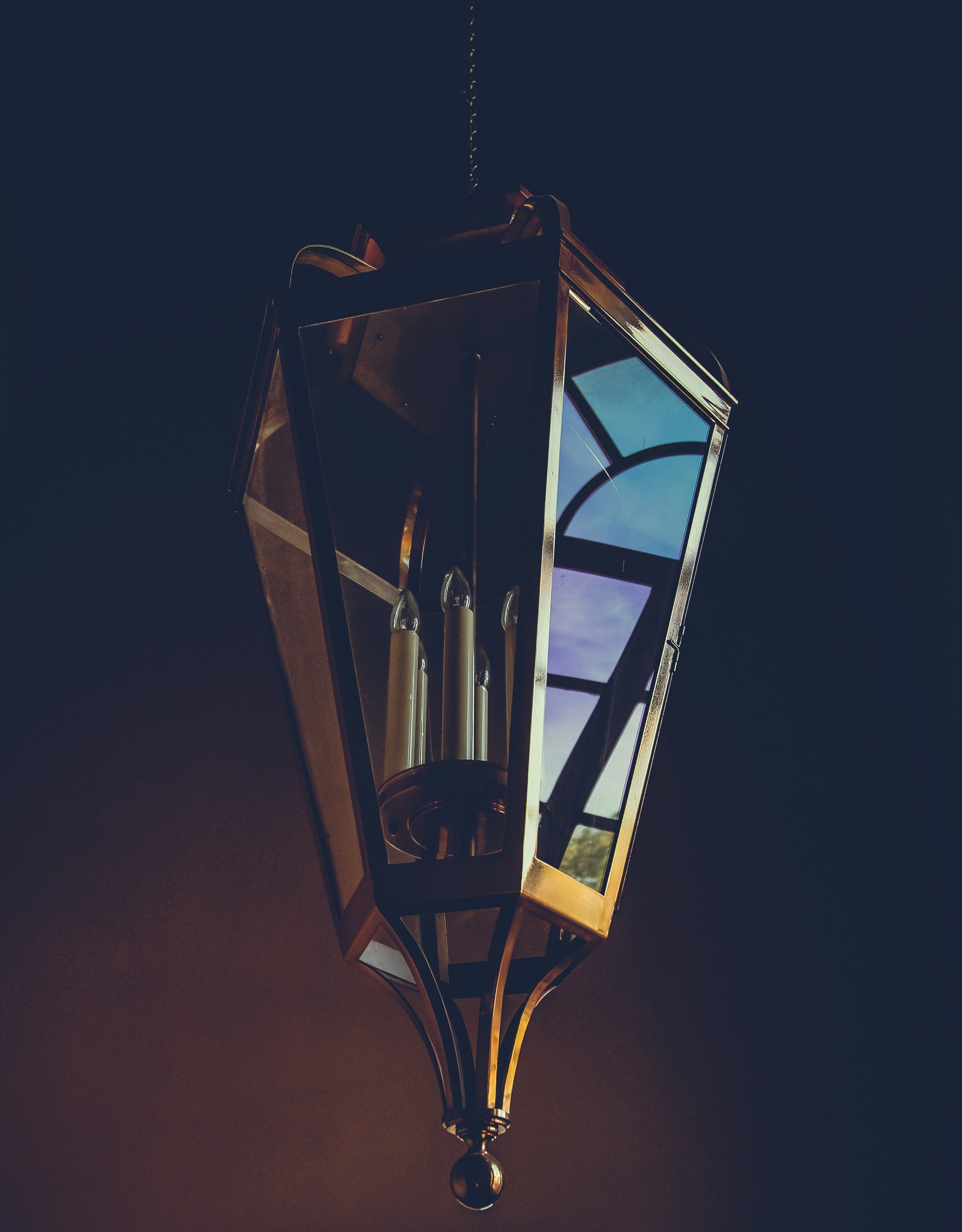 Midnight Lantern: Amber Glow Through Faceted Glass