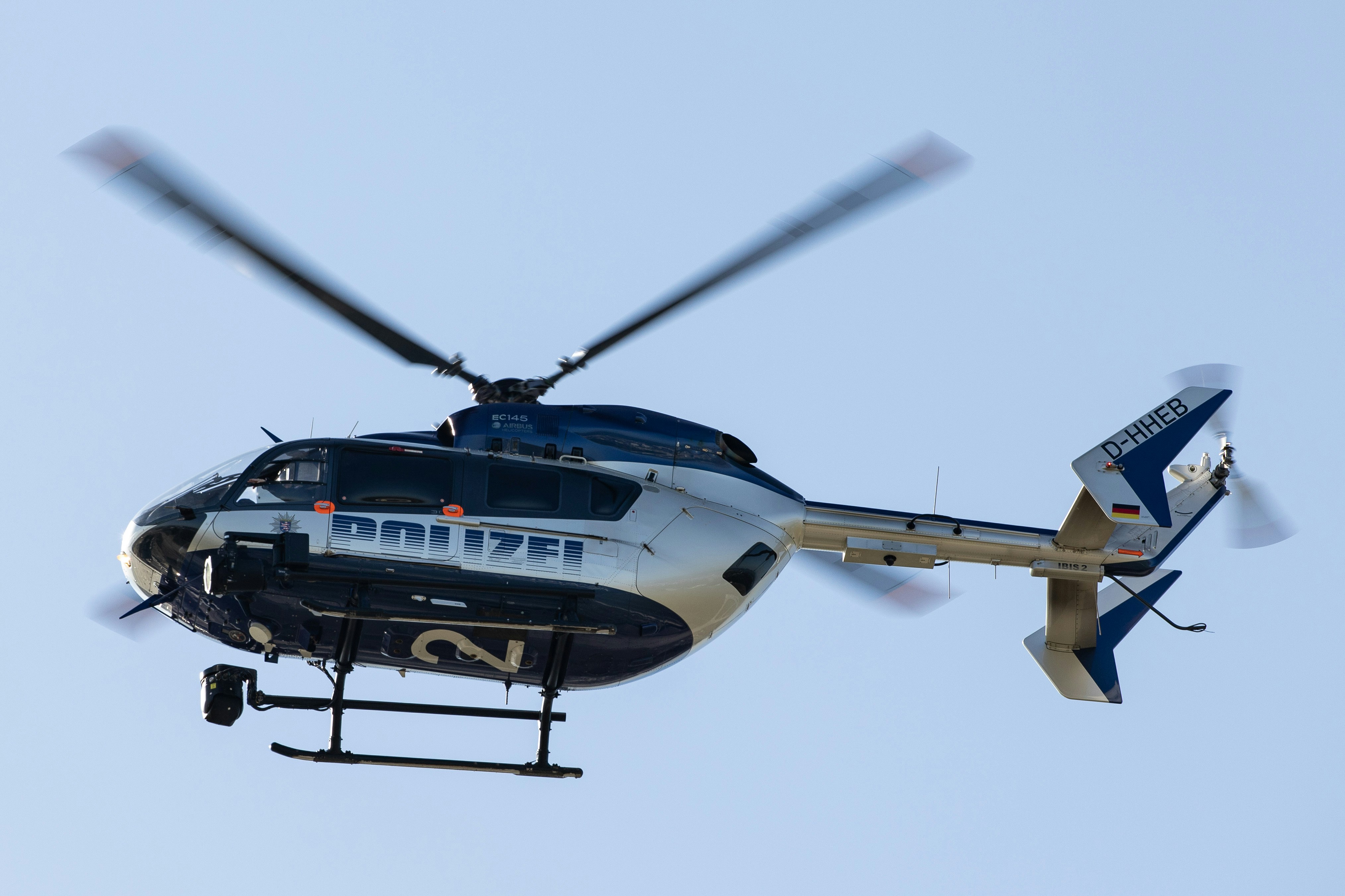 Low angle view of police helicopter photo – Free Grey Image on Unsplash