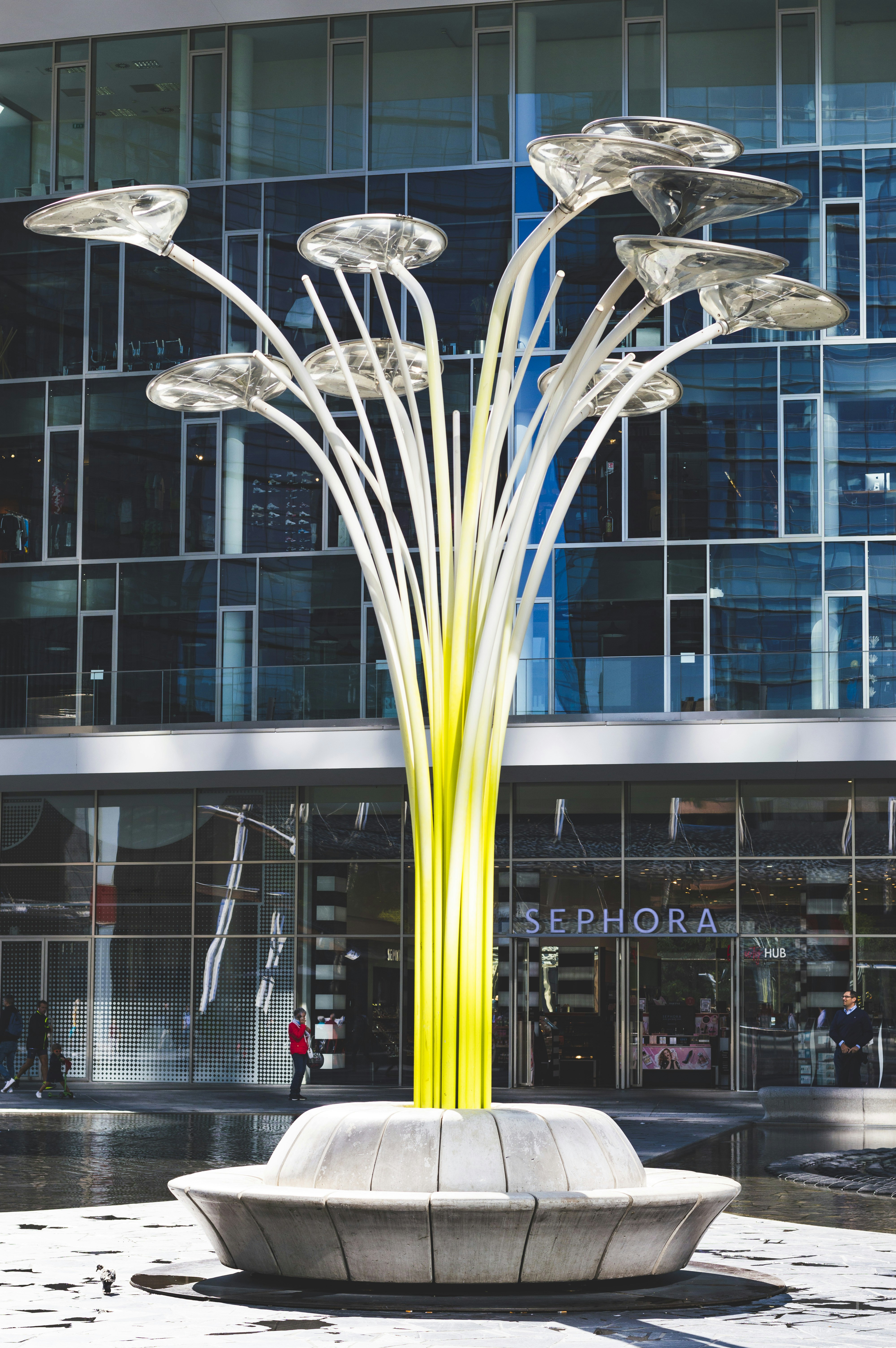 Urban Flame: A Neon-yellow Fountain Sprouts in Front of Sephora