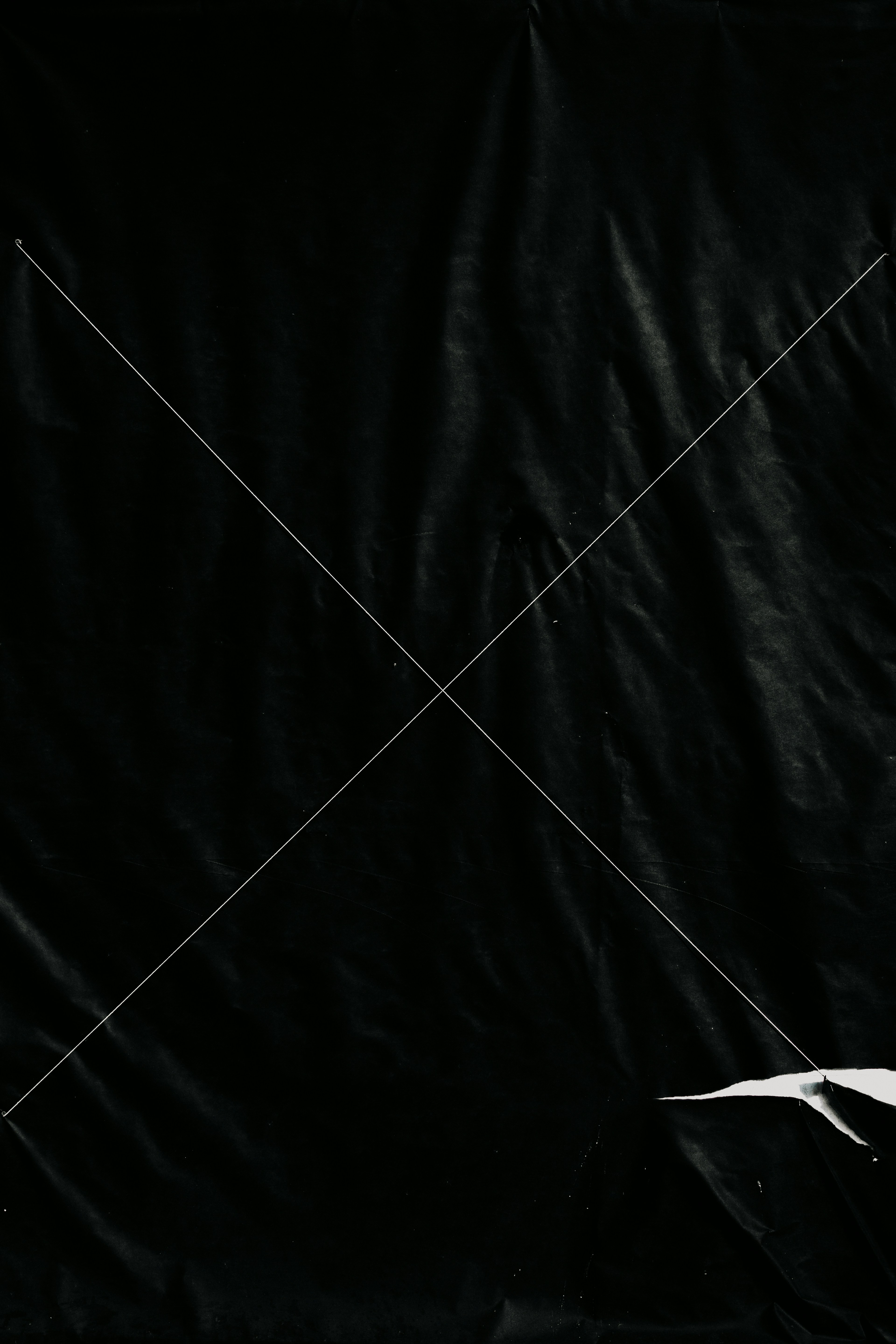 A black and white photo of a kite flying through the air photo – Free ...