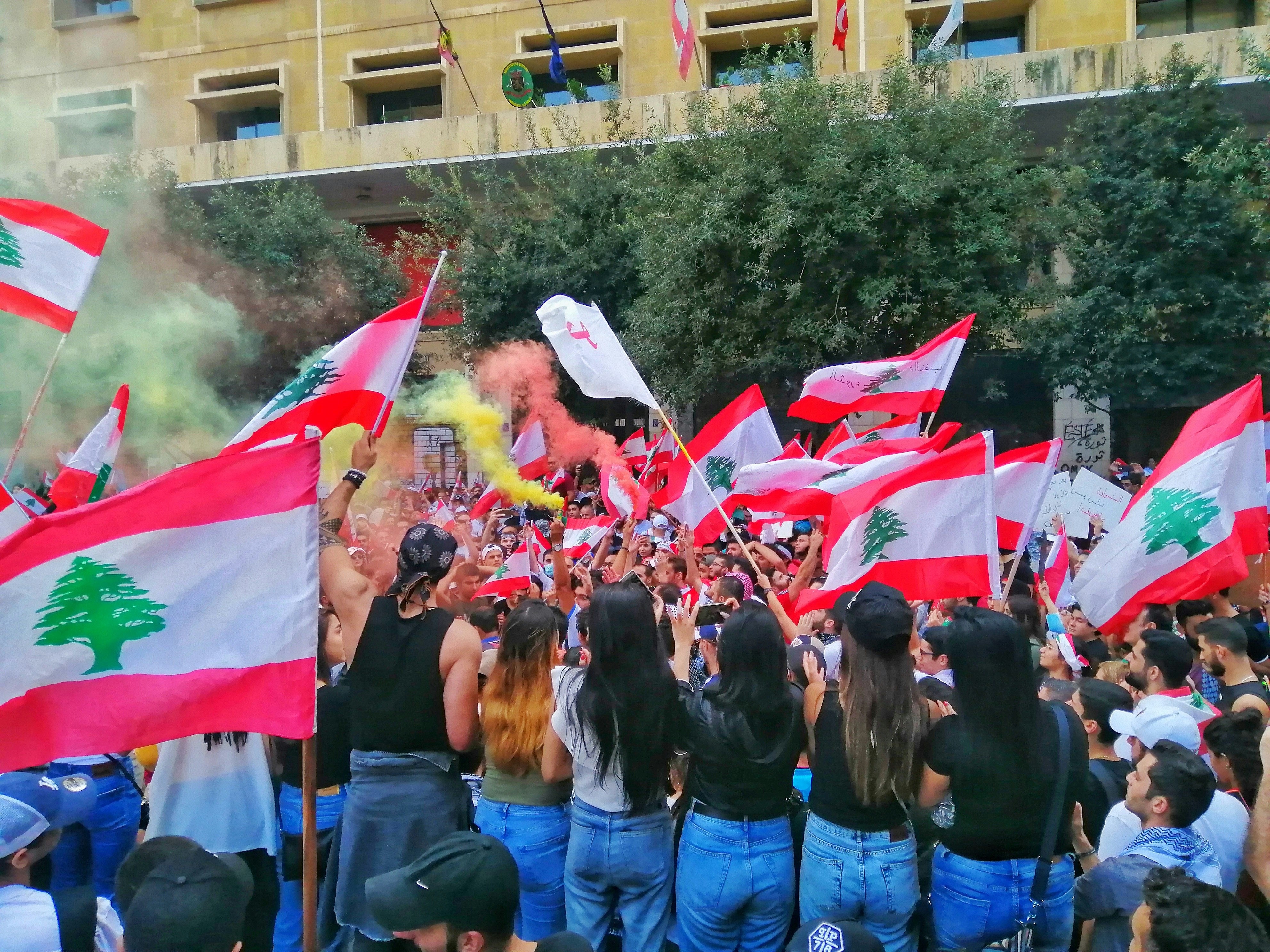 People waving flags photo – Free Human Image on Unsplash