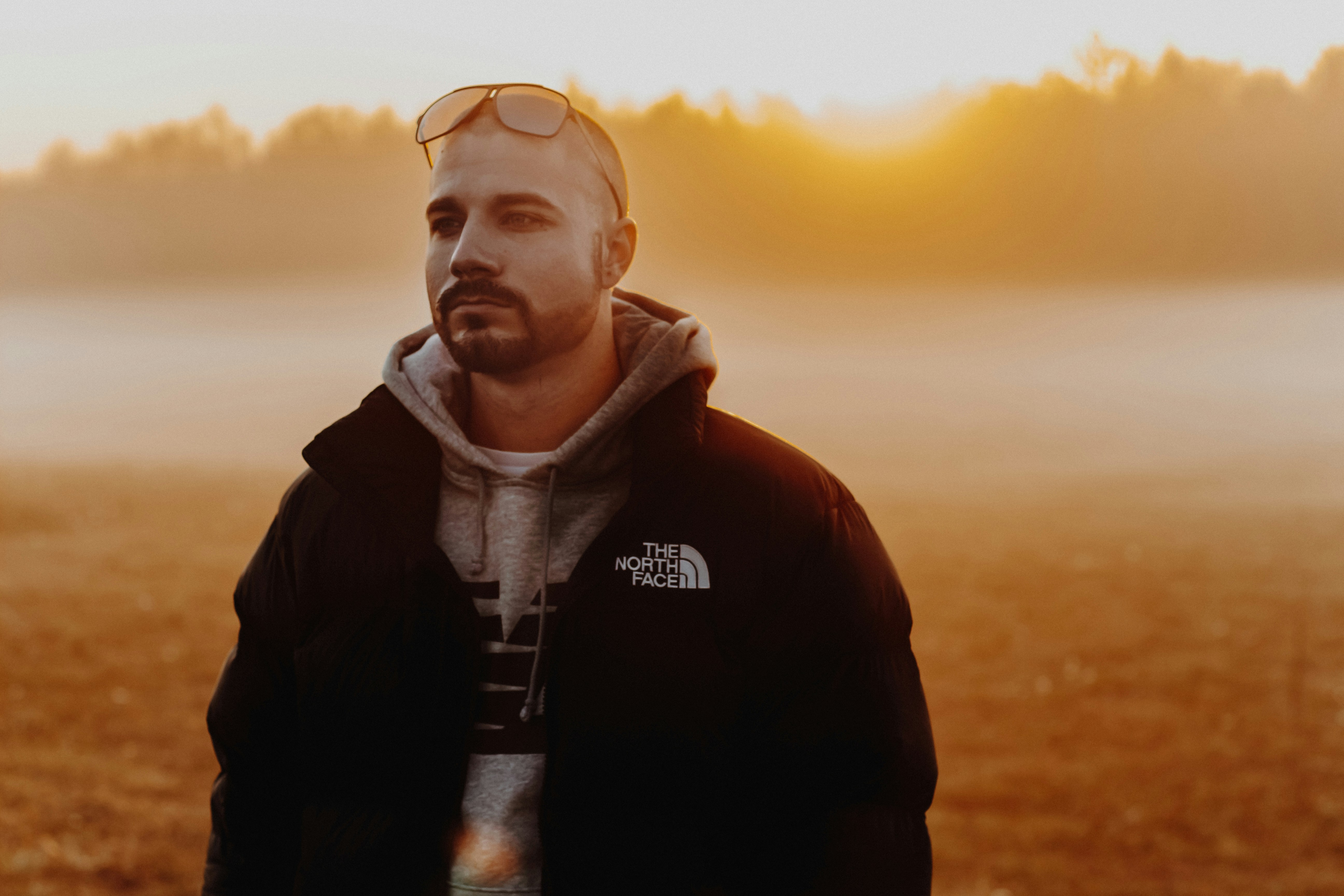 Golden Hour Stillness: Portrait at a Fog-Kissed Field