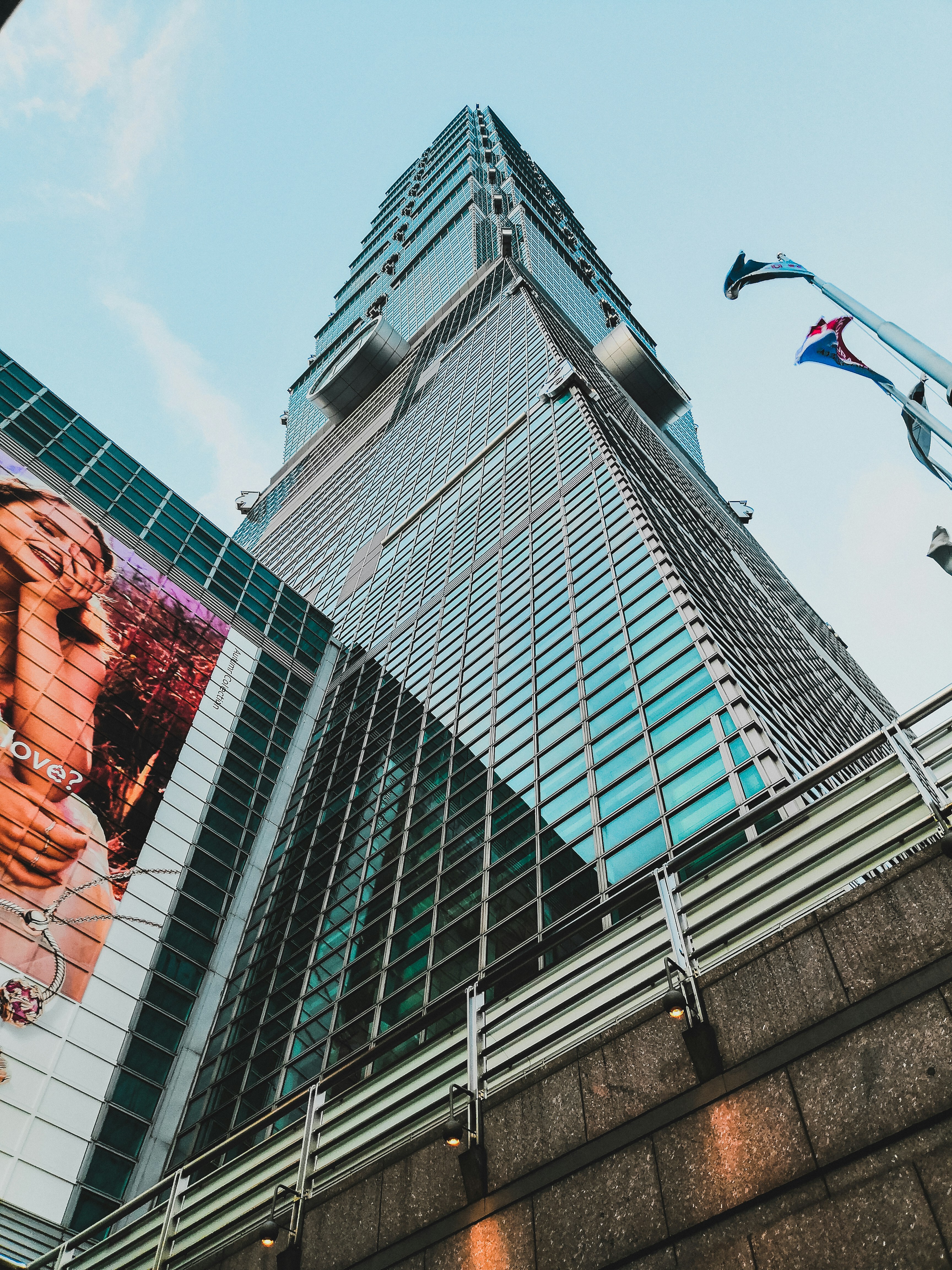Leaning Glass Colossus: A Tilted Upward Look at the City Tower