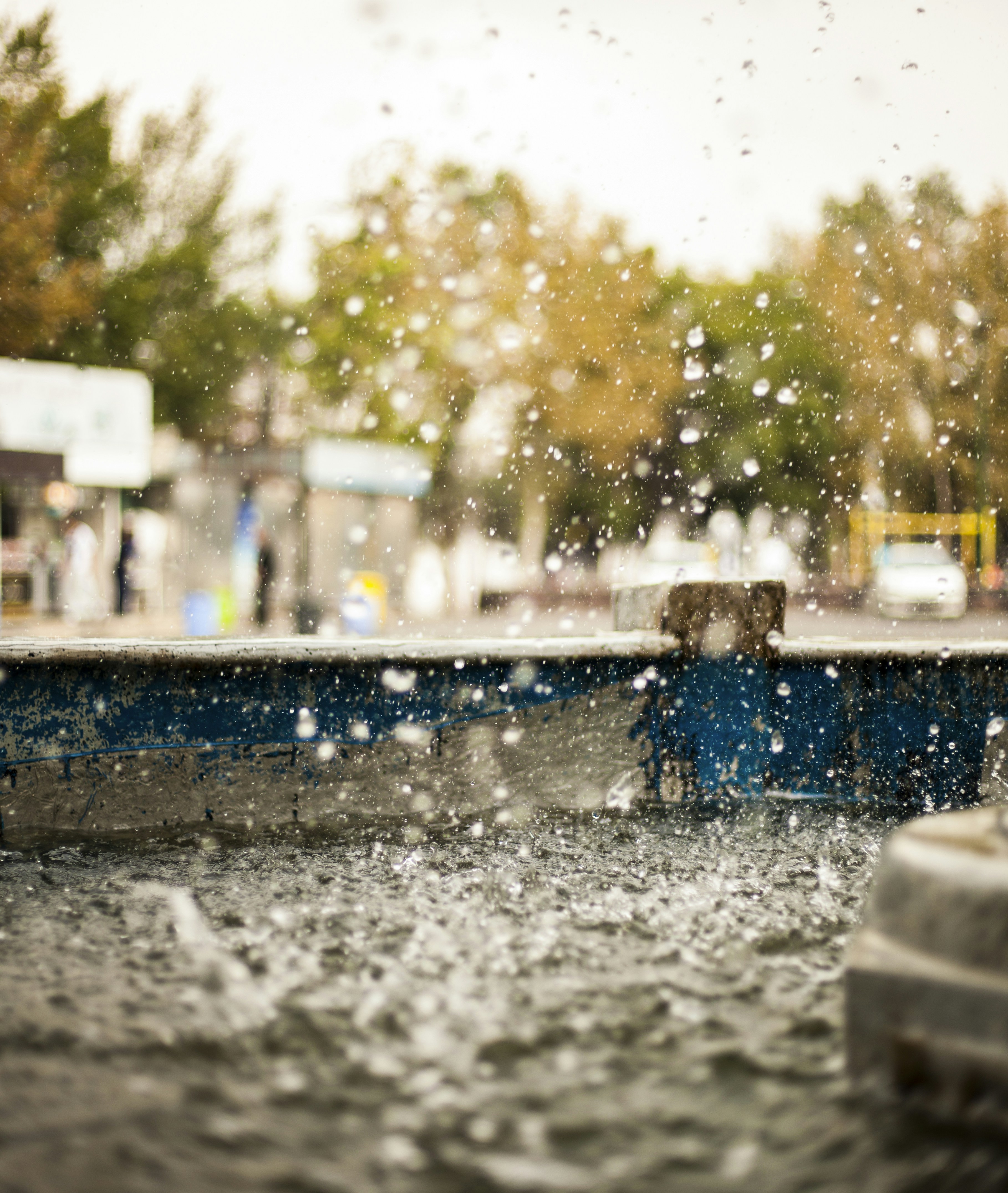 Splashing Fountain Echoes in a Calm Square
