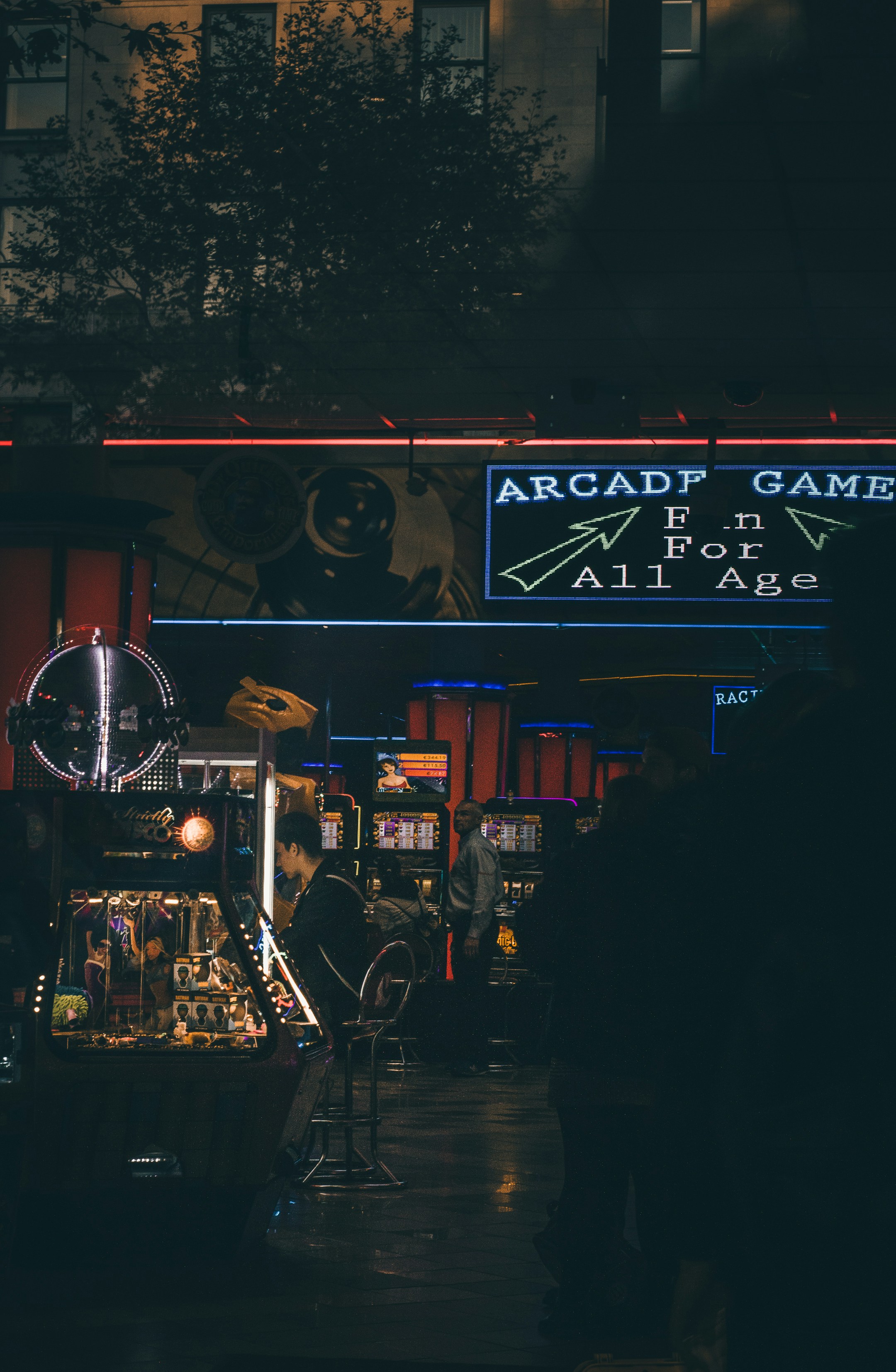 Lighted Arcade Game signage at night photo – Free Human Image on Unsplash