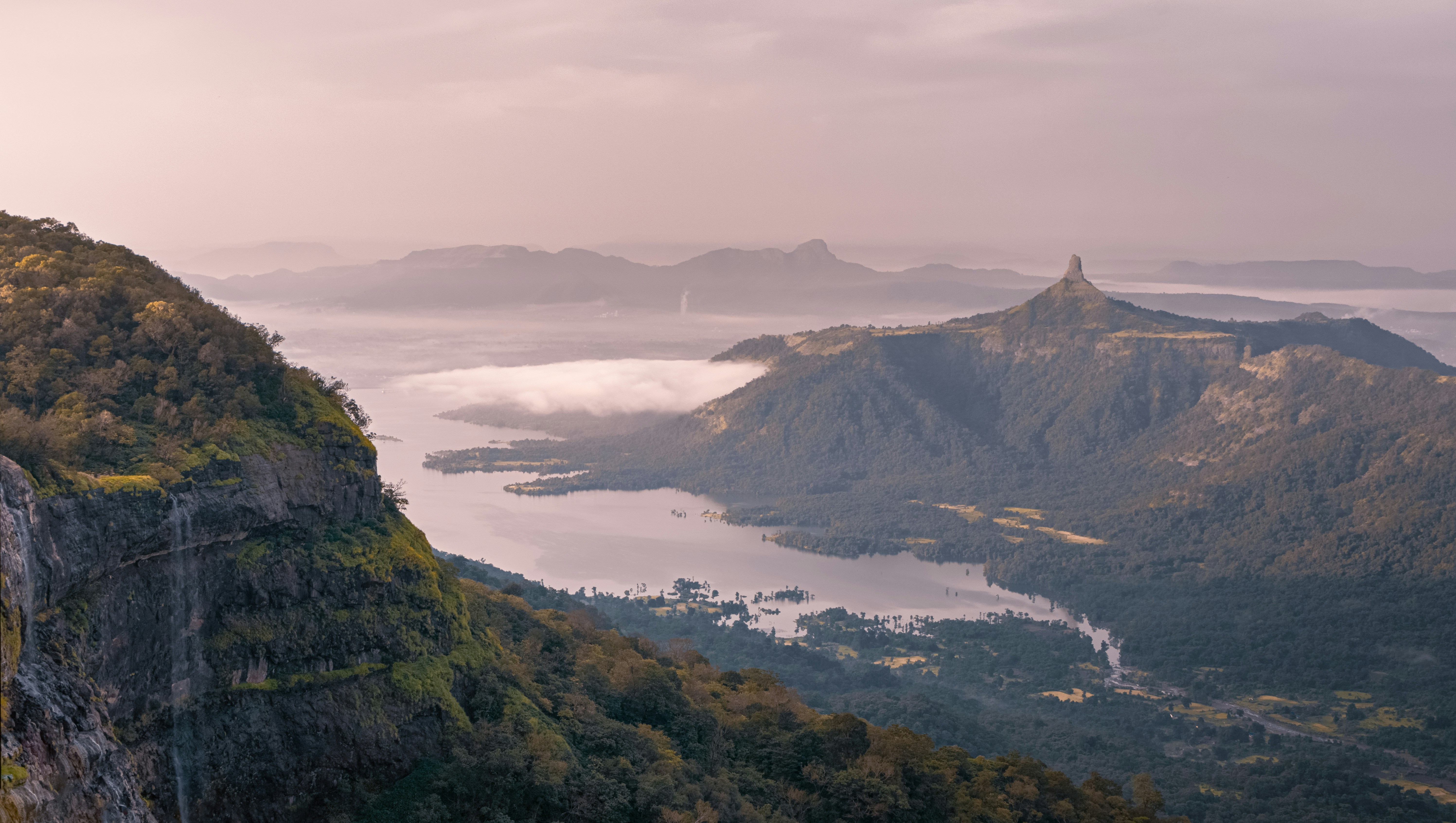 Dawn Crown Over Mist-Washed Valleys and the Lone Peak