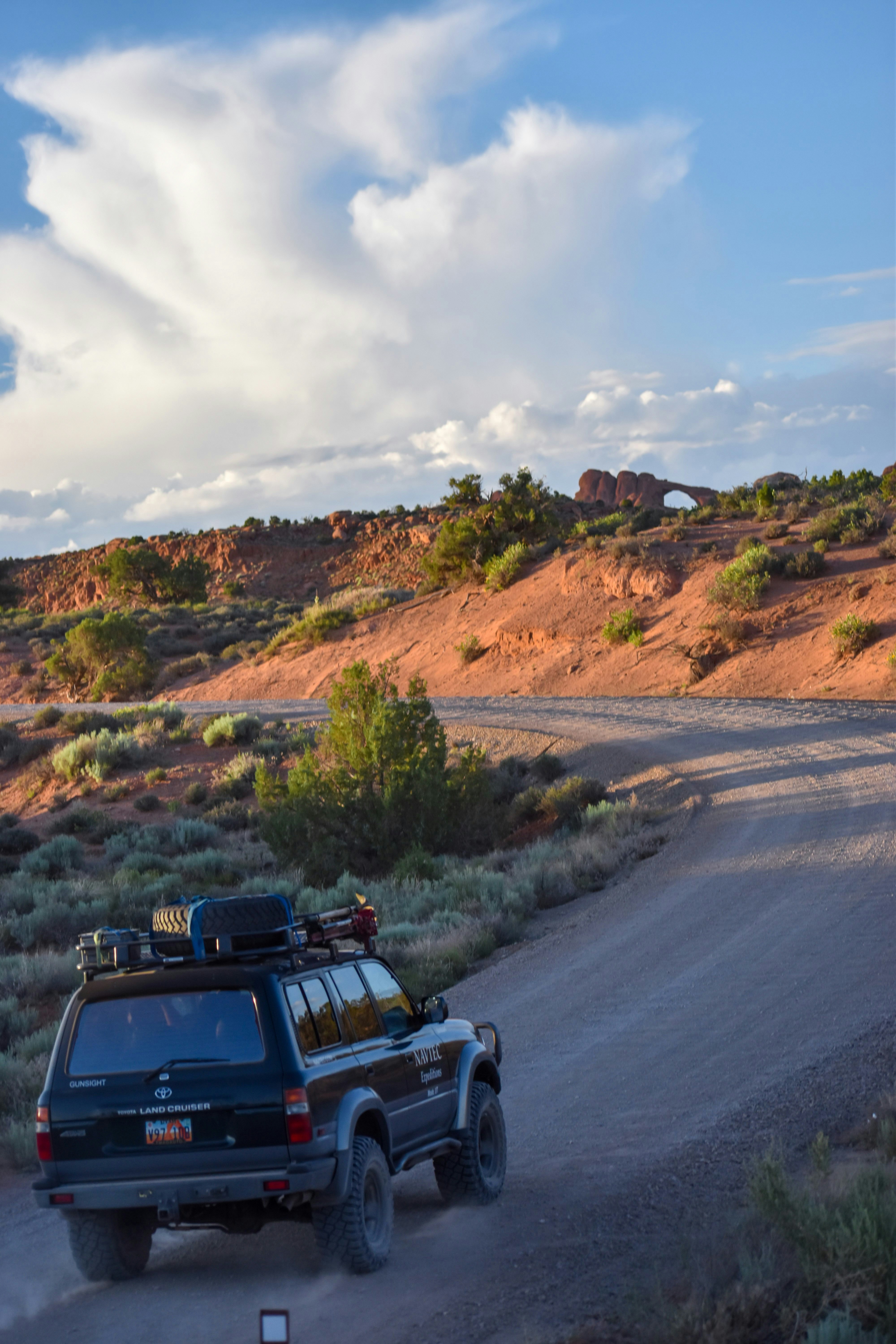 Black off-road vehicle on asphalt road photo – Free Transportation ...