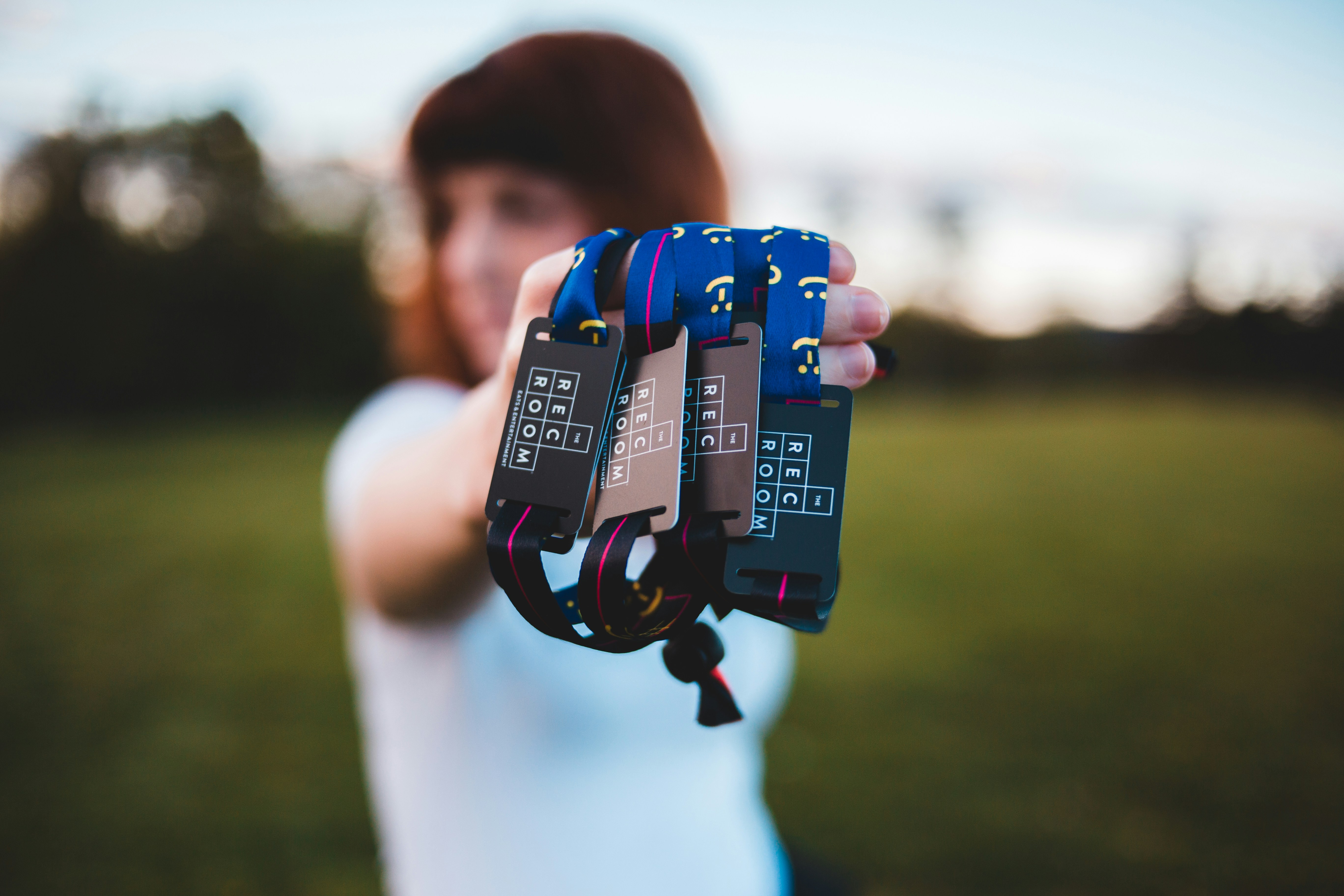 Person holding blue lanyards close up photo photo – Free Human Image on ...