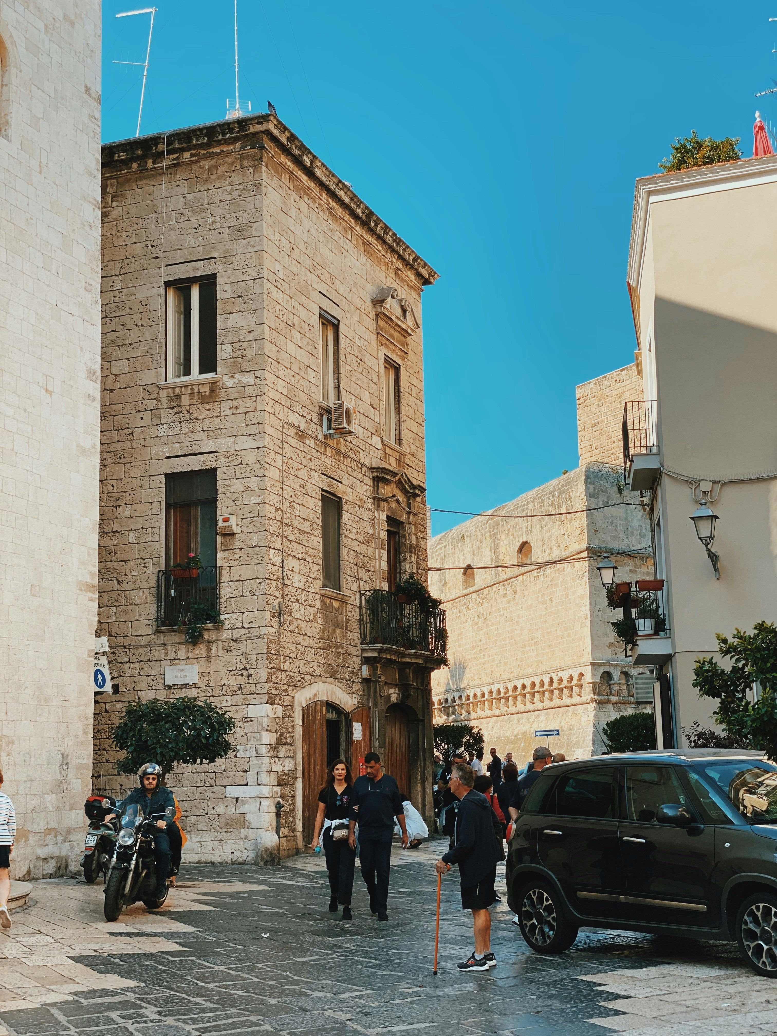 People beside buildings photo – Free Person Image on Unsplash