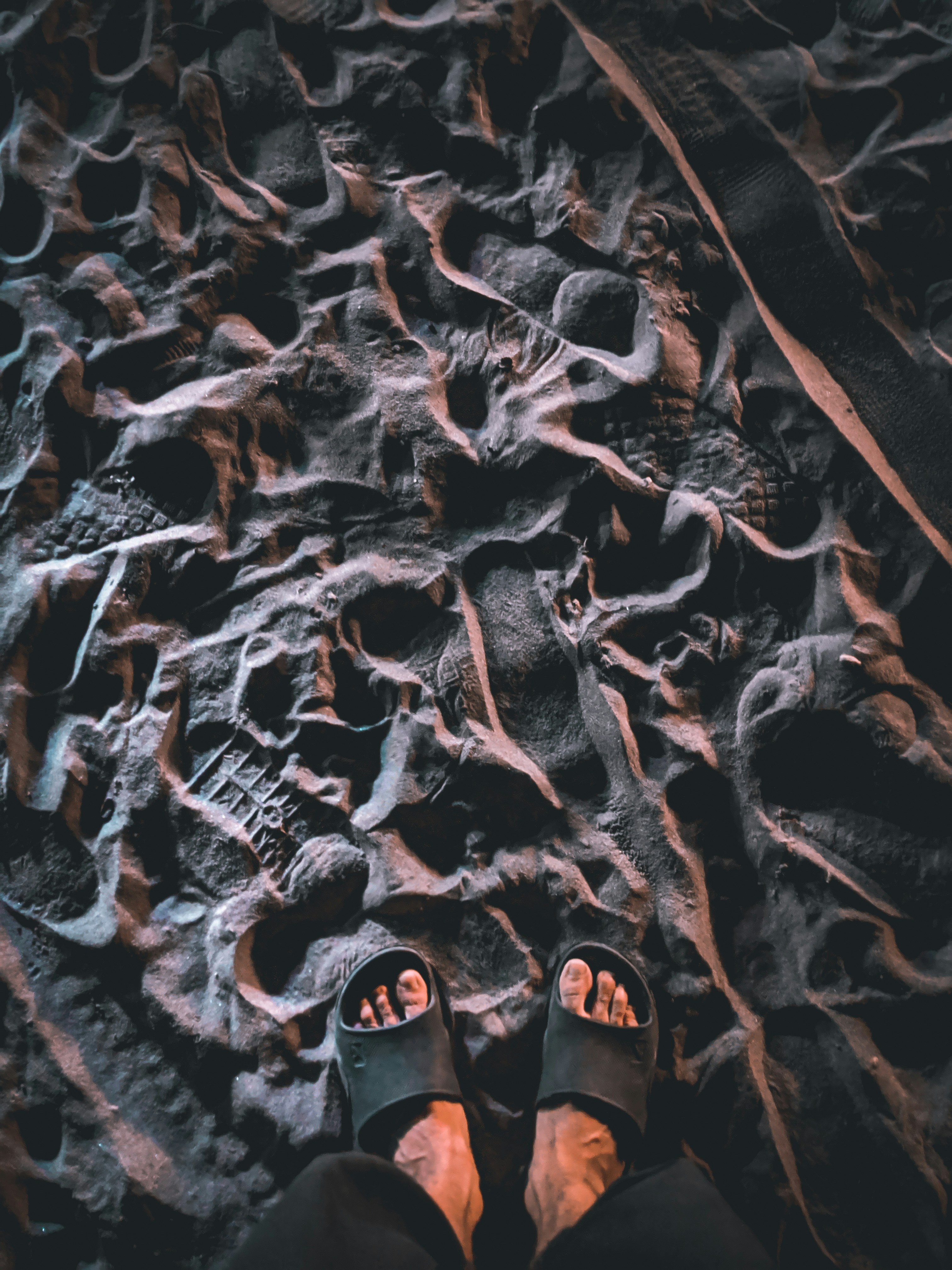 Sandscape Steps: Feet in Shadow on Footprints