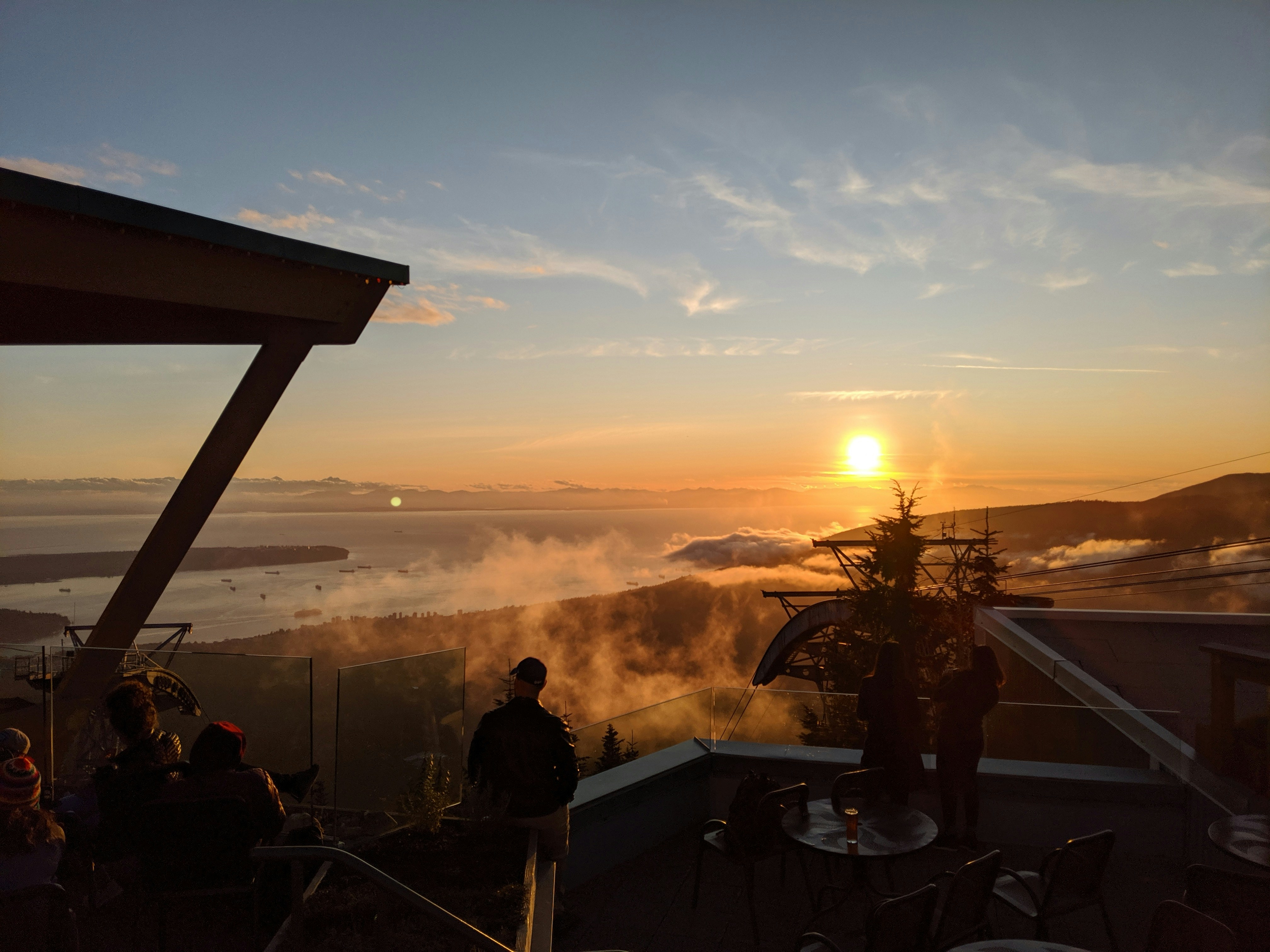 Sunset Over Terrace: silhouettes and coastal fog from above