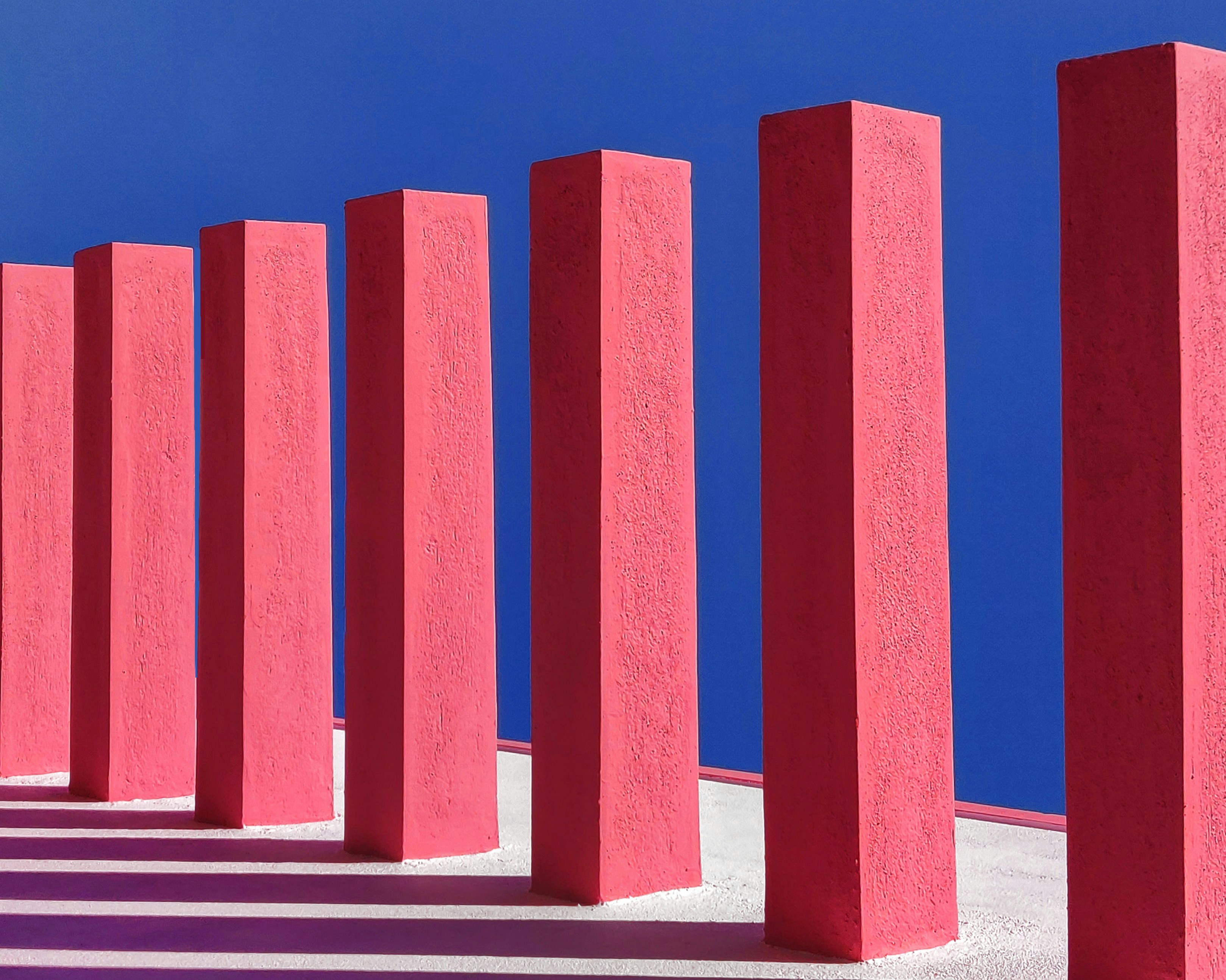 Pink painted columns photo – Free Building Image on Unsplash