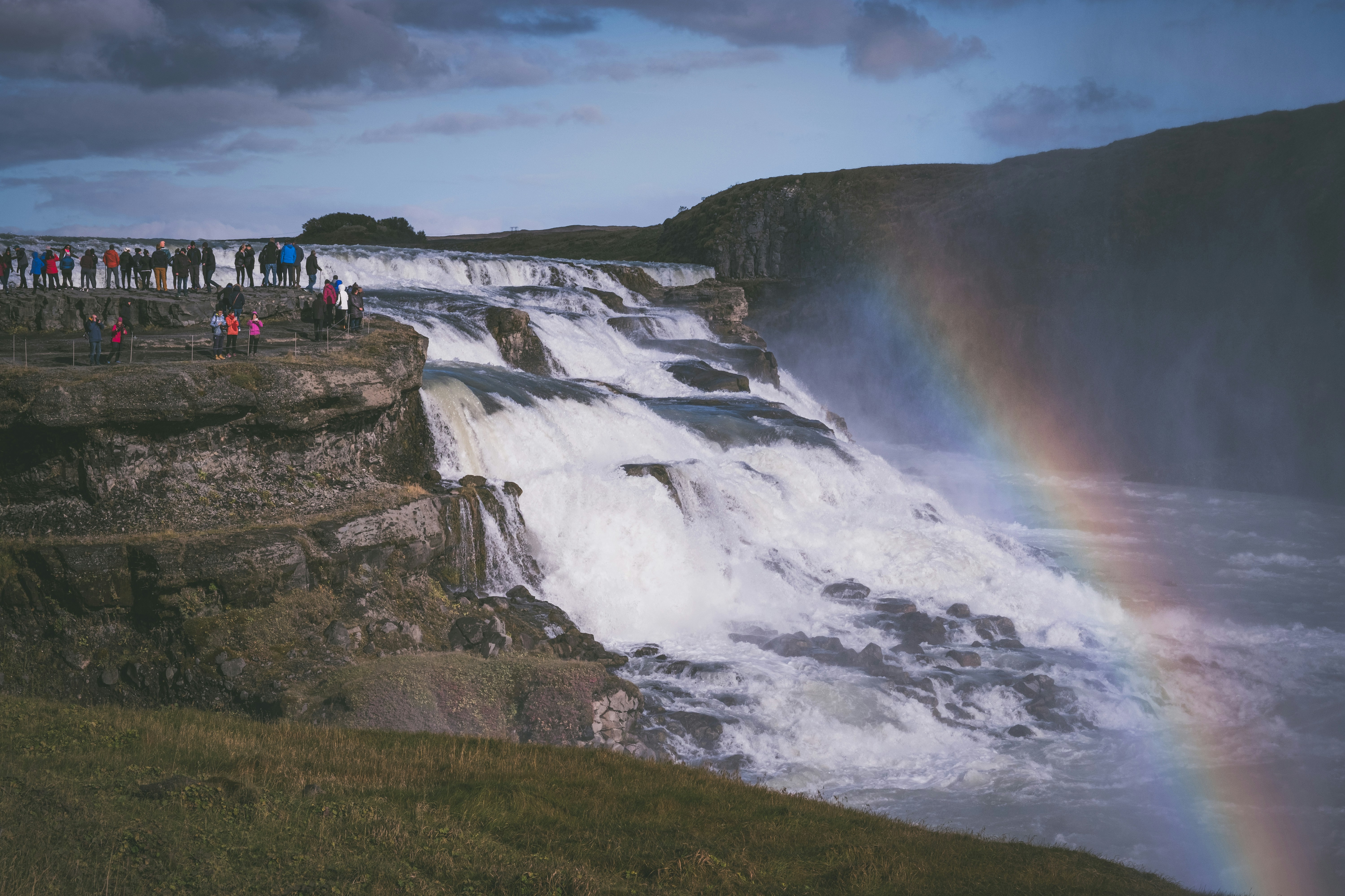 Rainbow Over the Cascades: Onlookers at the Edge