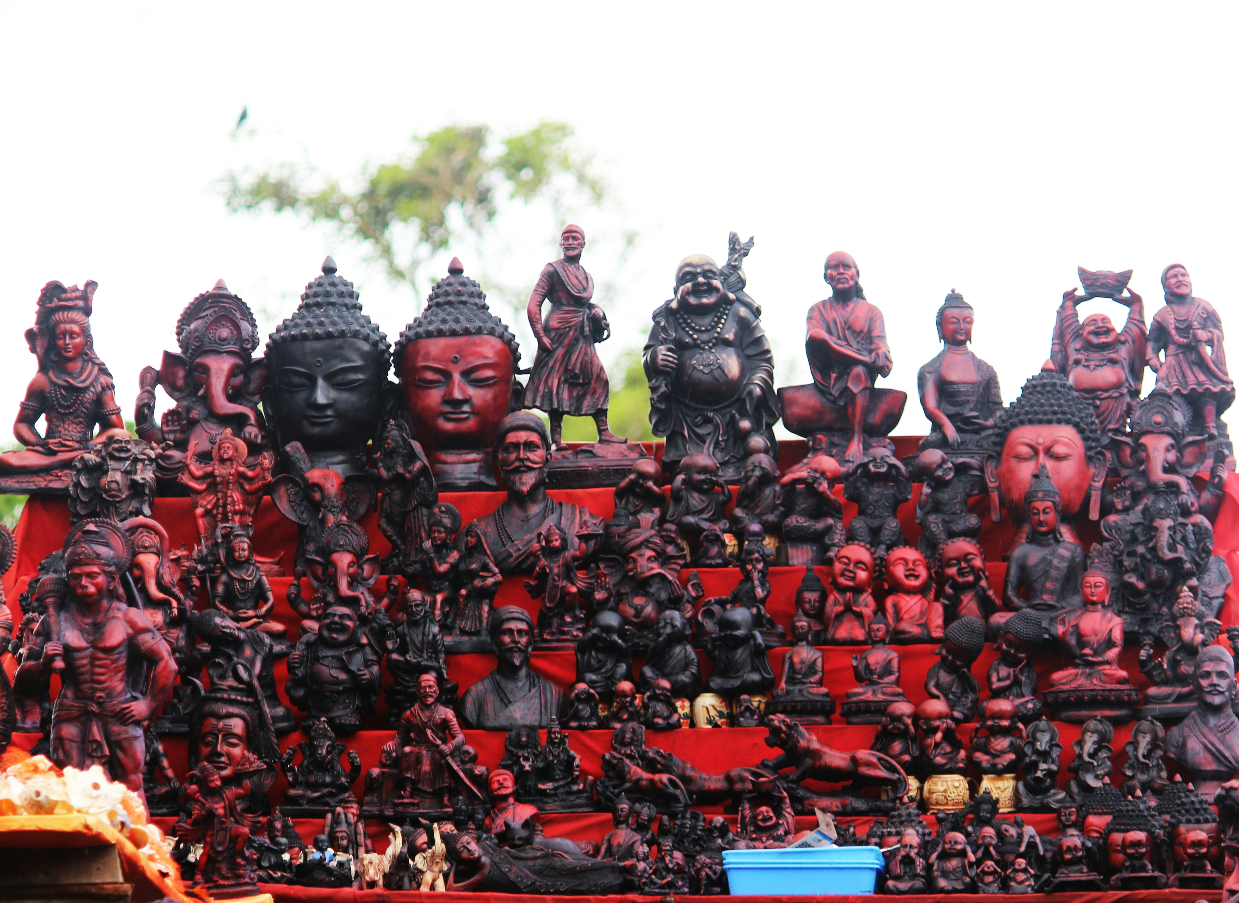 Crimson Shrine: A Tiered Assembly of Tiny Buddhas