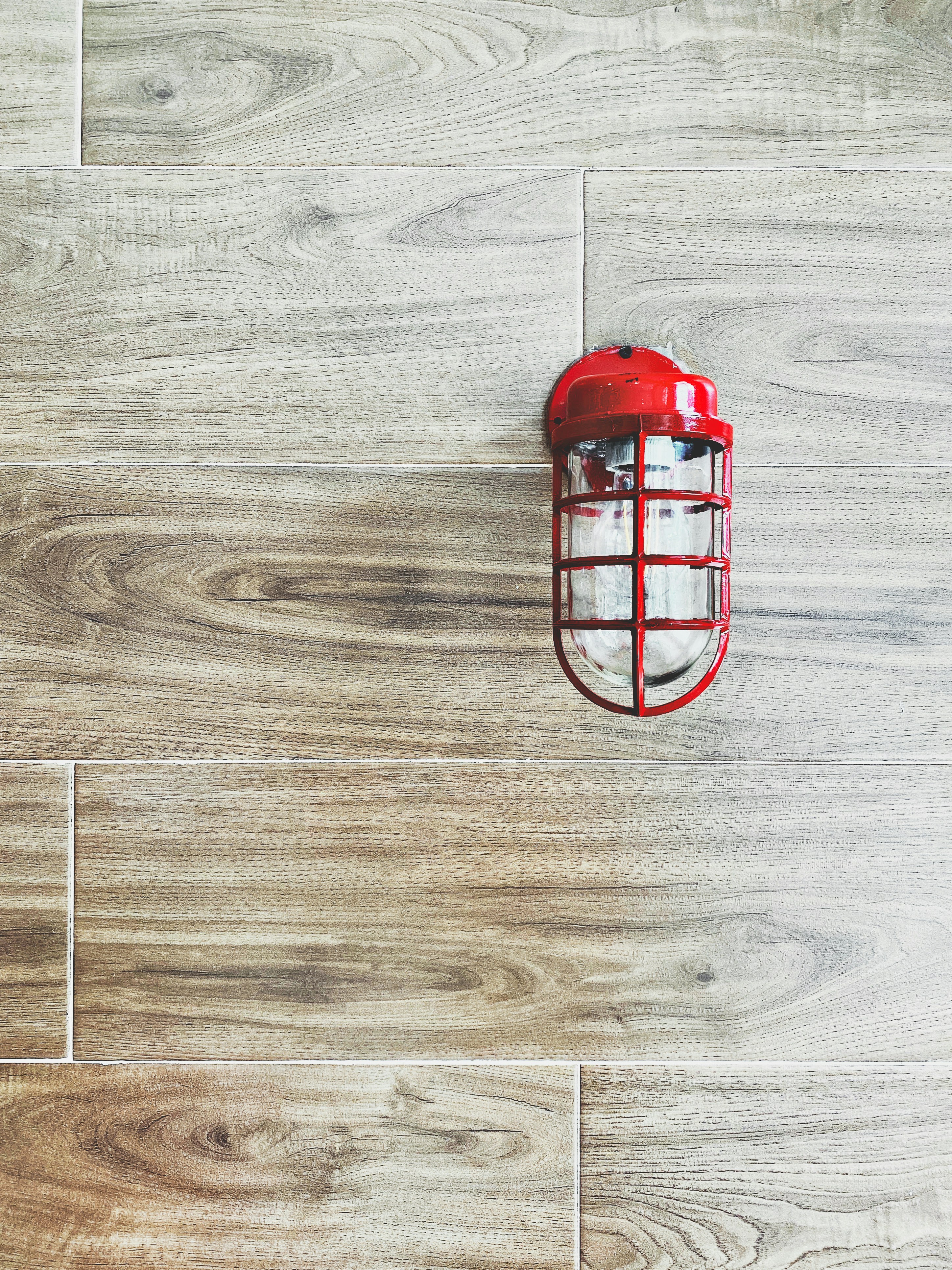 Crimson Guard on Wooden Tiles: A Quiet Industrial Moment