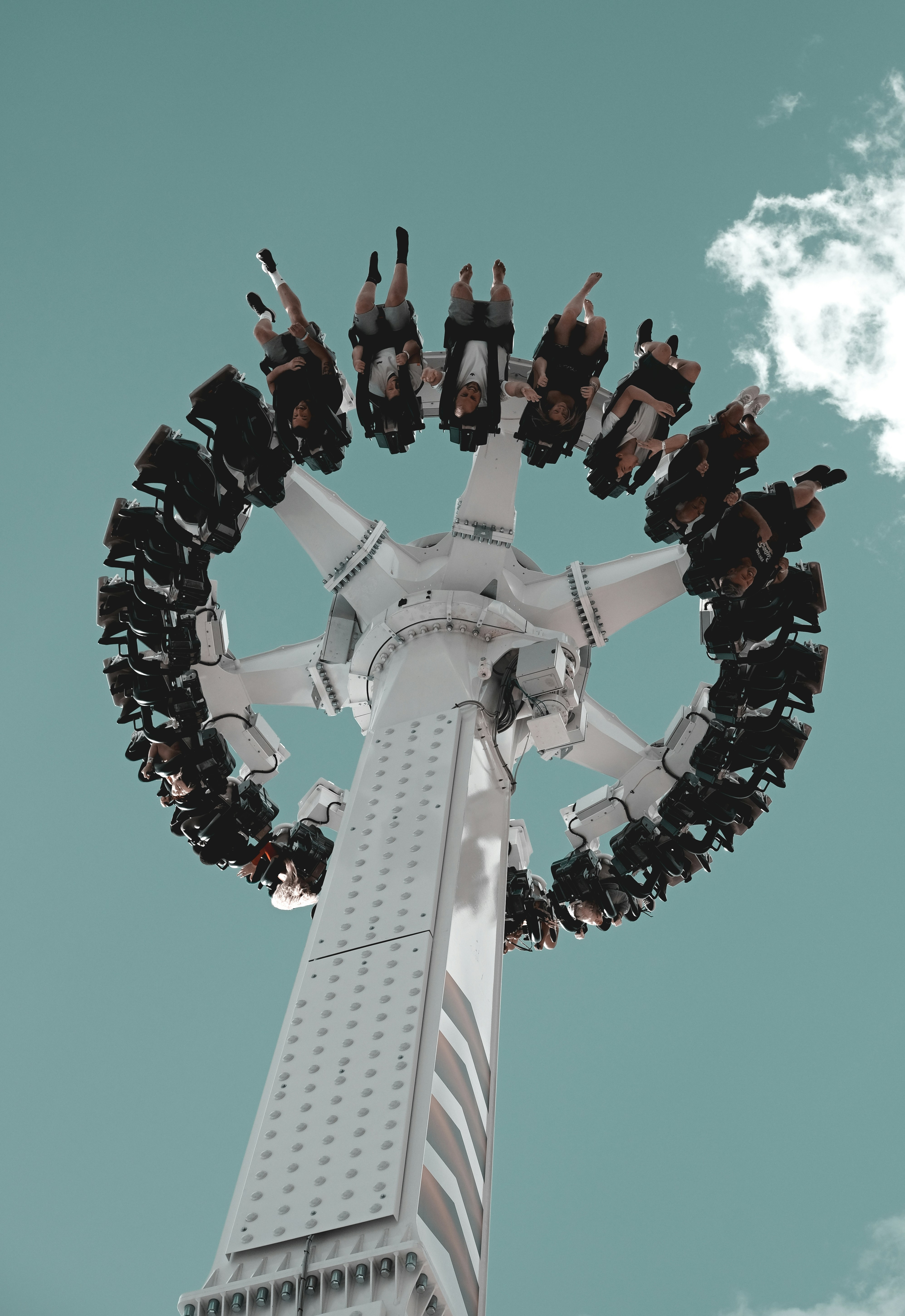 Low-angle photography of people riding a drop-down amusement tower ...
