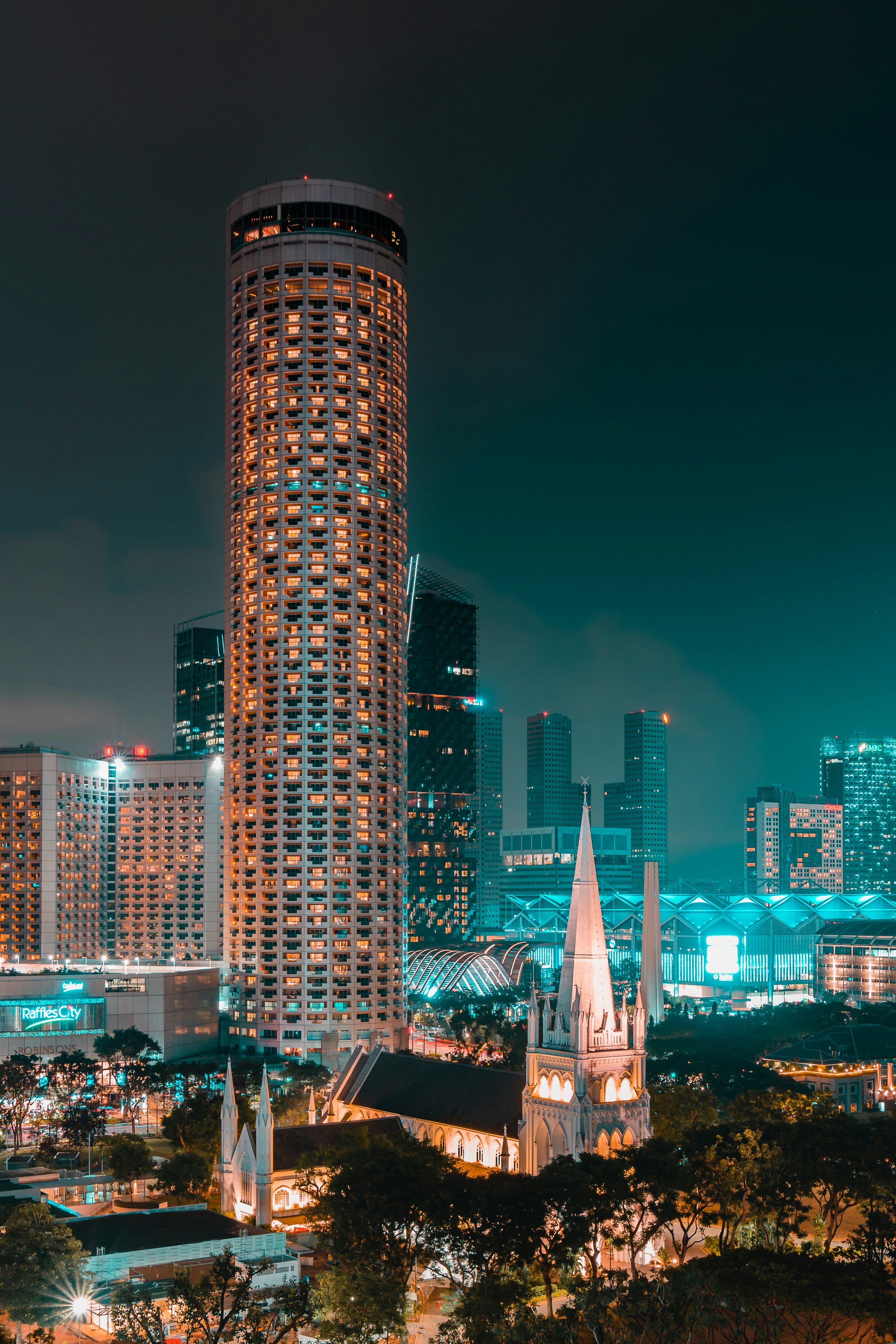 Aerial photography of city with high-rise buildings during night time ...