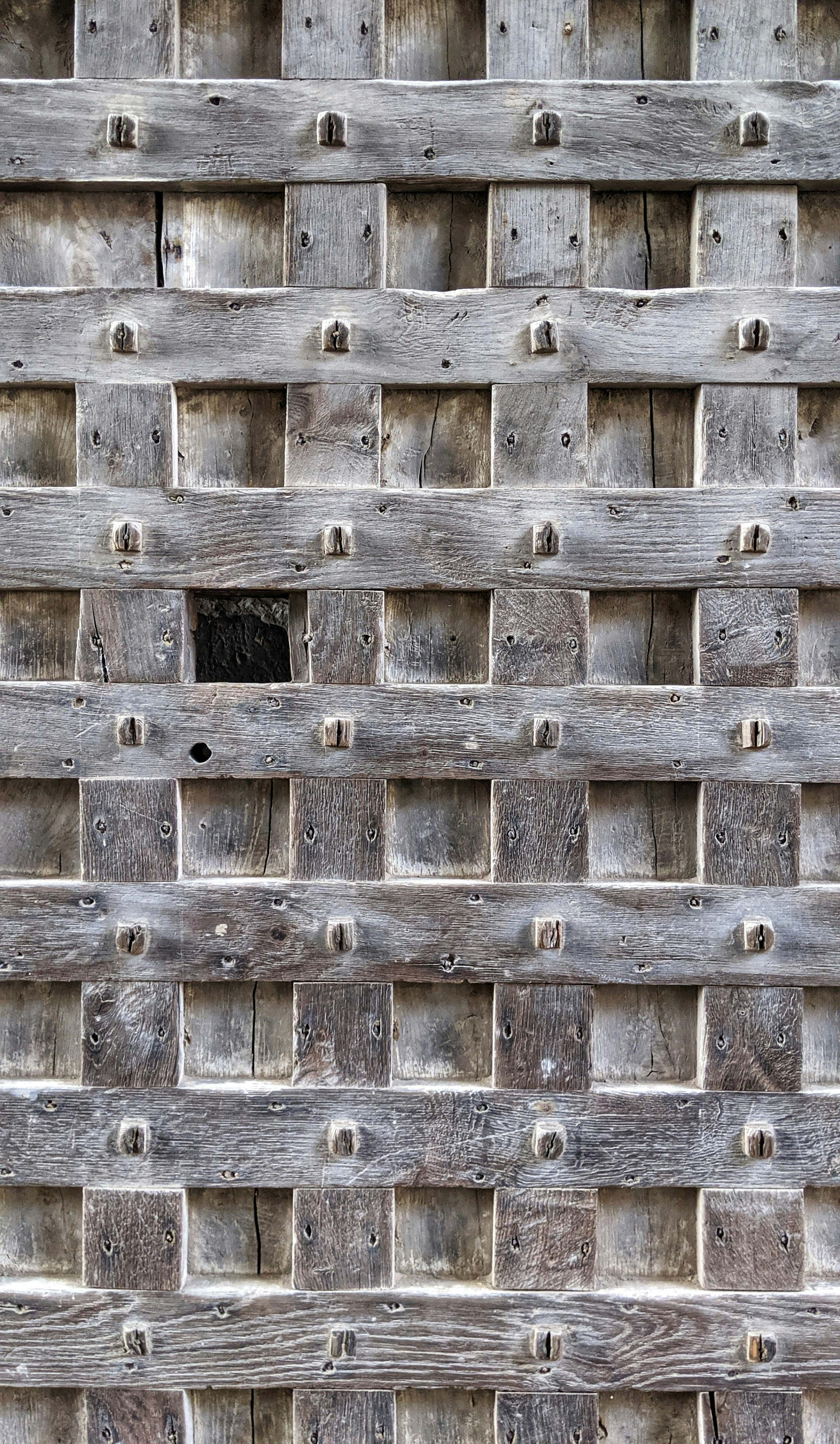 Hidden Hollow in a Weathered Wood Lattice