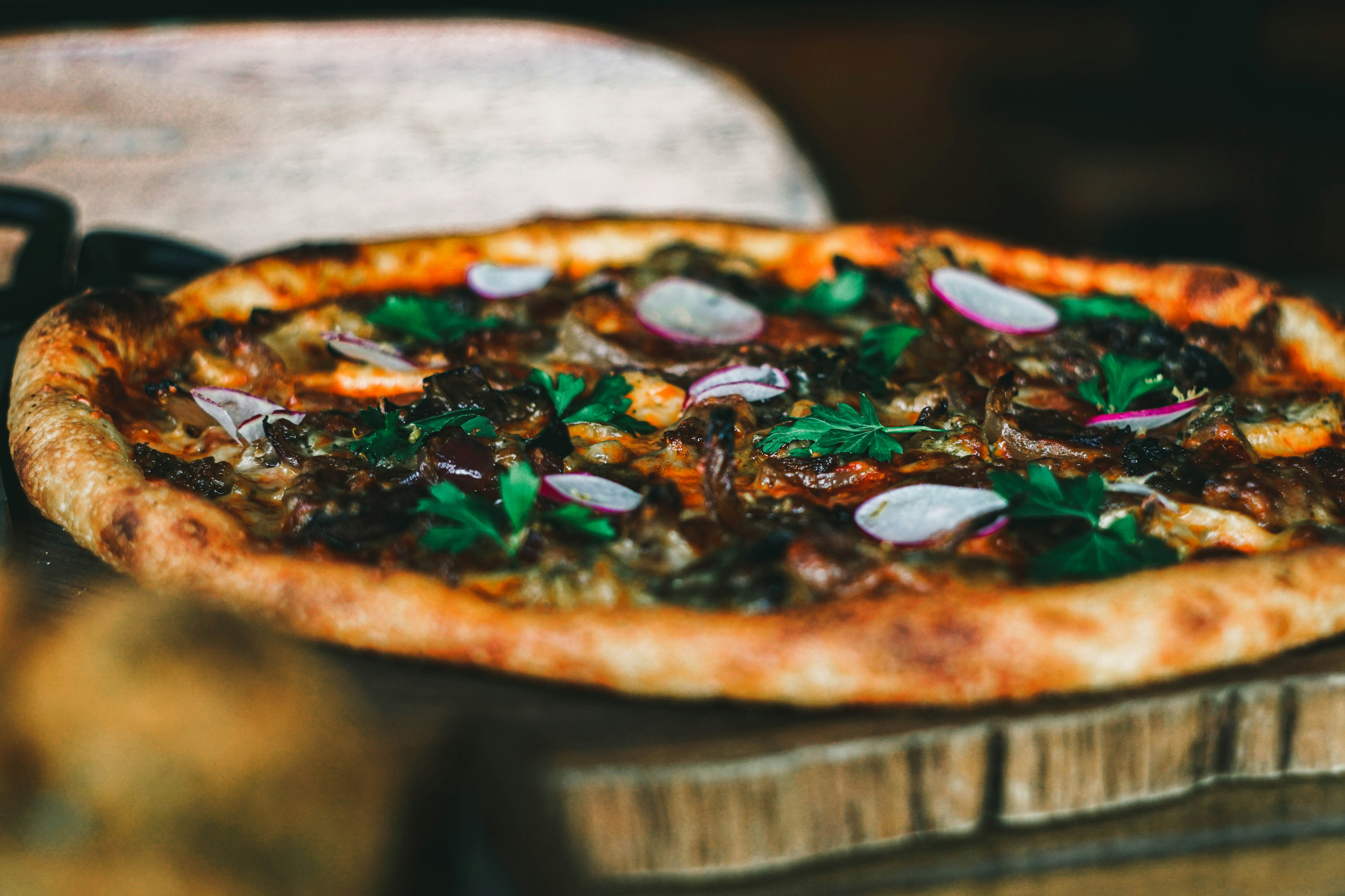 Charred Crust, Emerald Parsley: A Rustic Wood-Fired Pizza Portrait