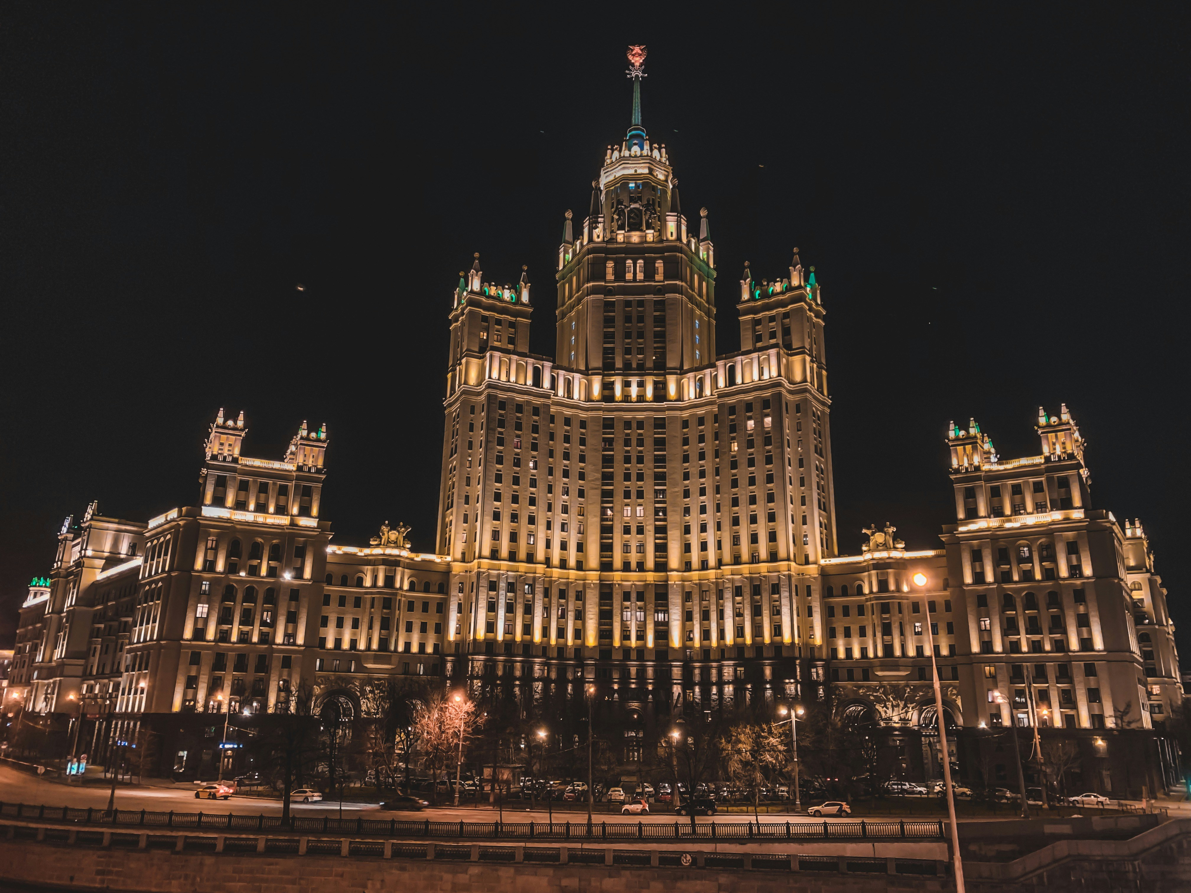 Brown buildings at night photo – Free Brown Image on Unsplash