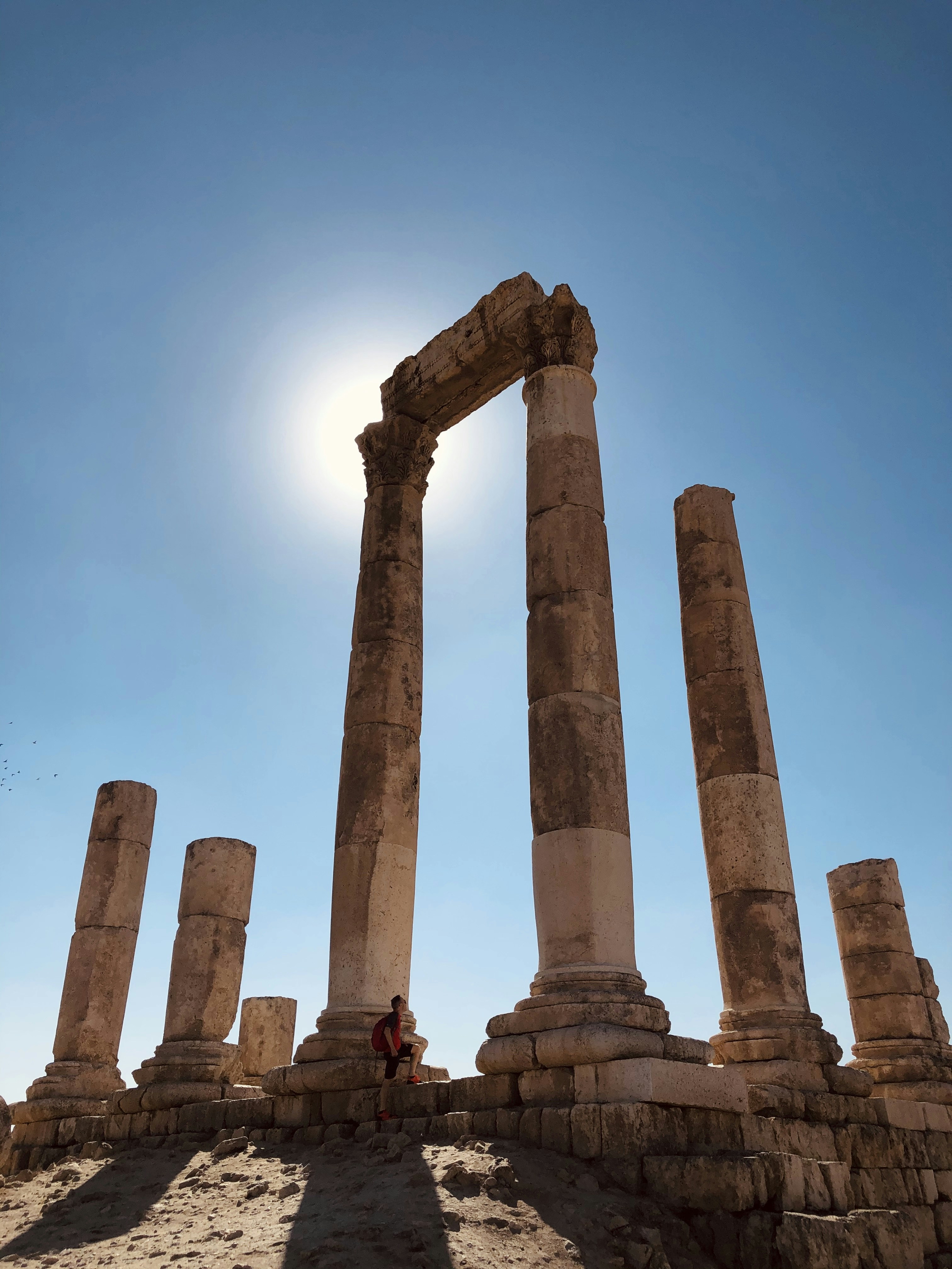 Ruins at Noon: The Sunlit Gateway of Ancient Columns