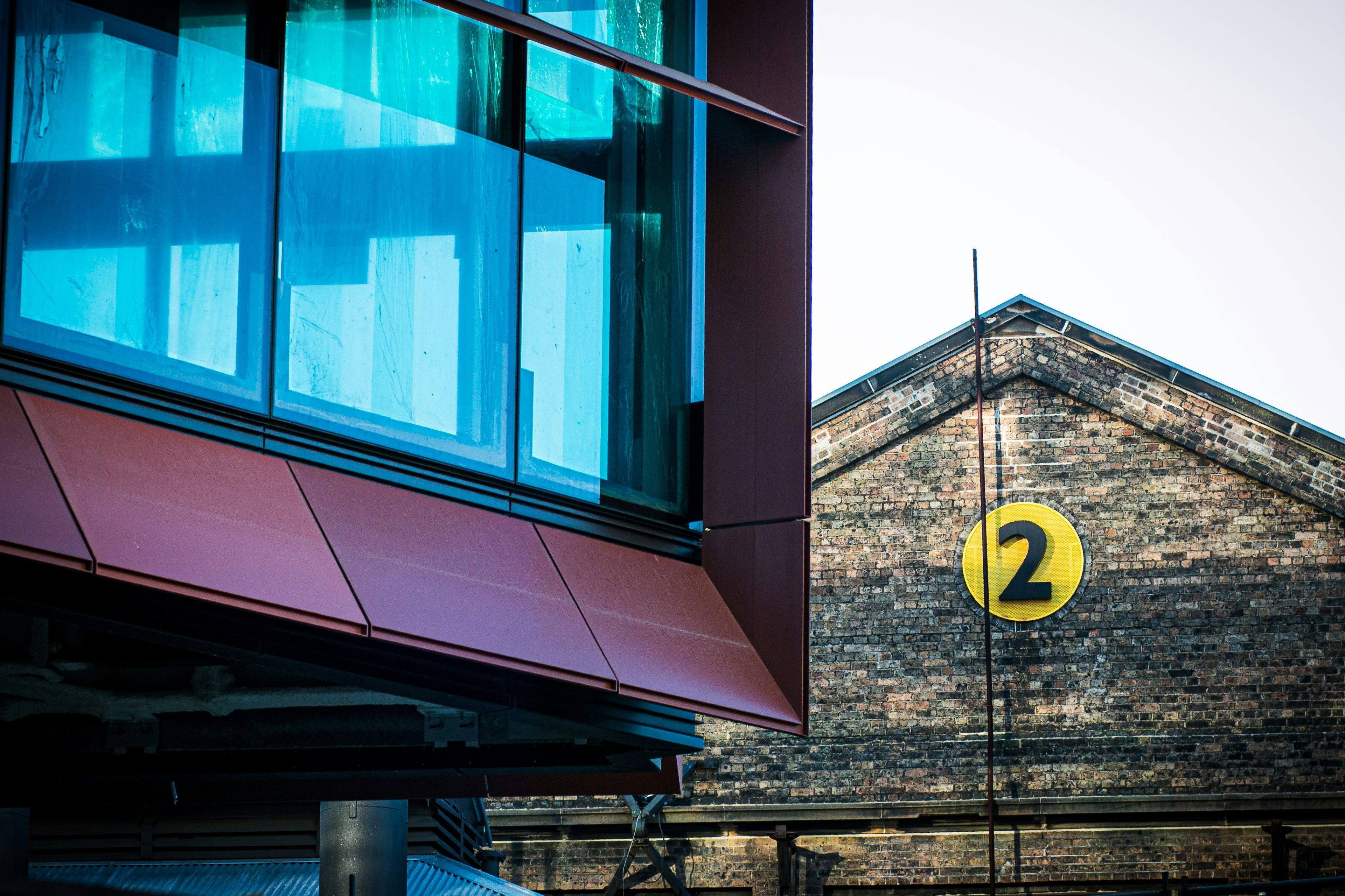 Maroon building with blue glass window photo – Free Eveleigh nsw Image ...