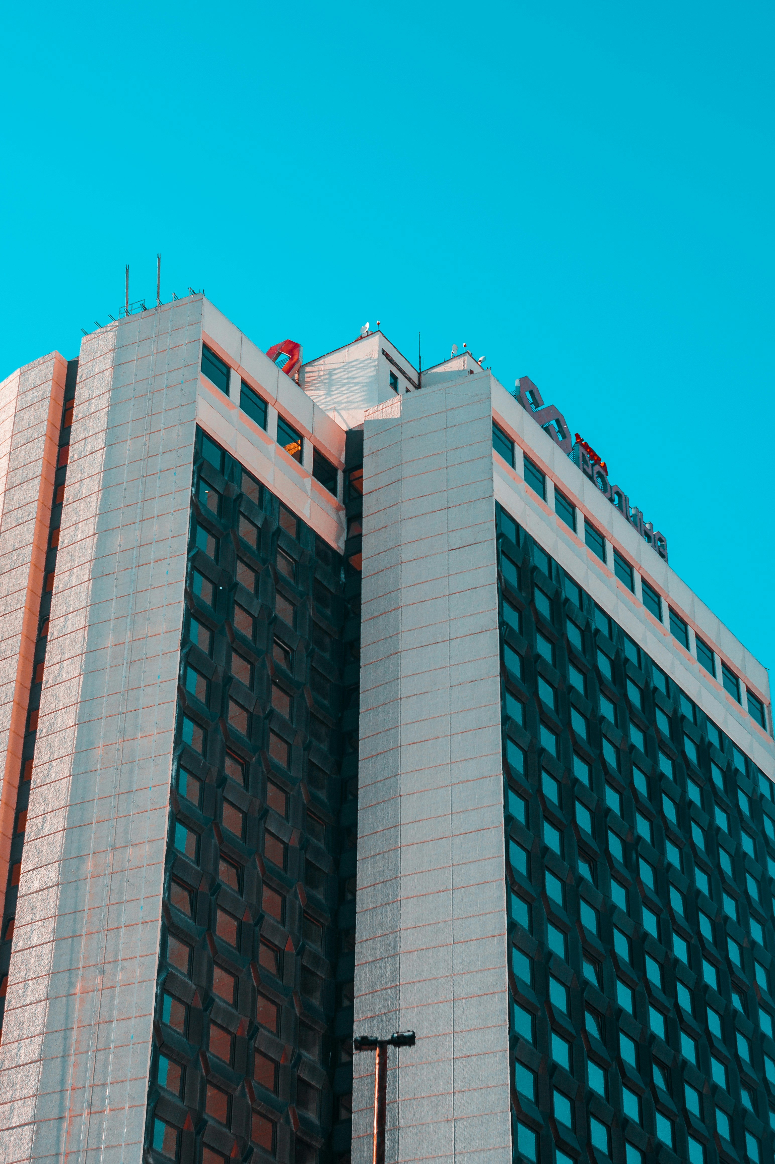 Architectural photography of beige and black city building photo – Free ...