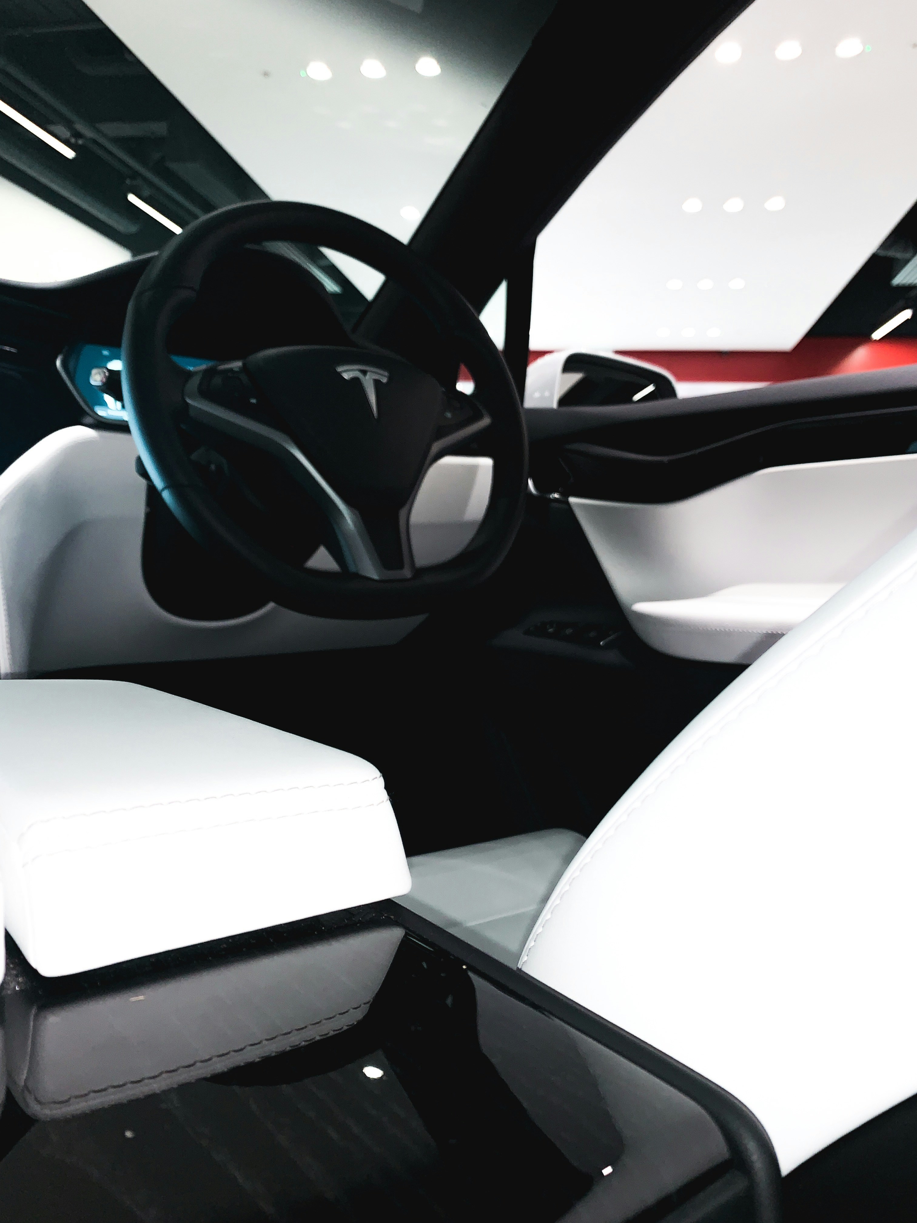 Showroom Quiet: The White Tesla Cockpit in Focus