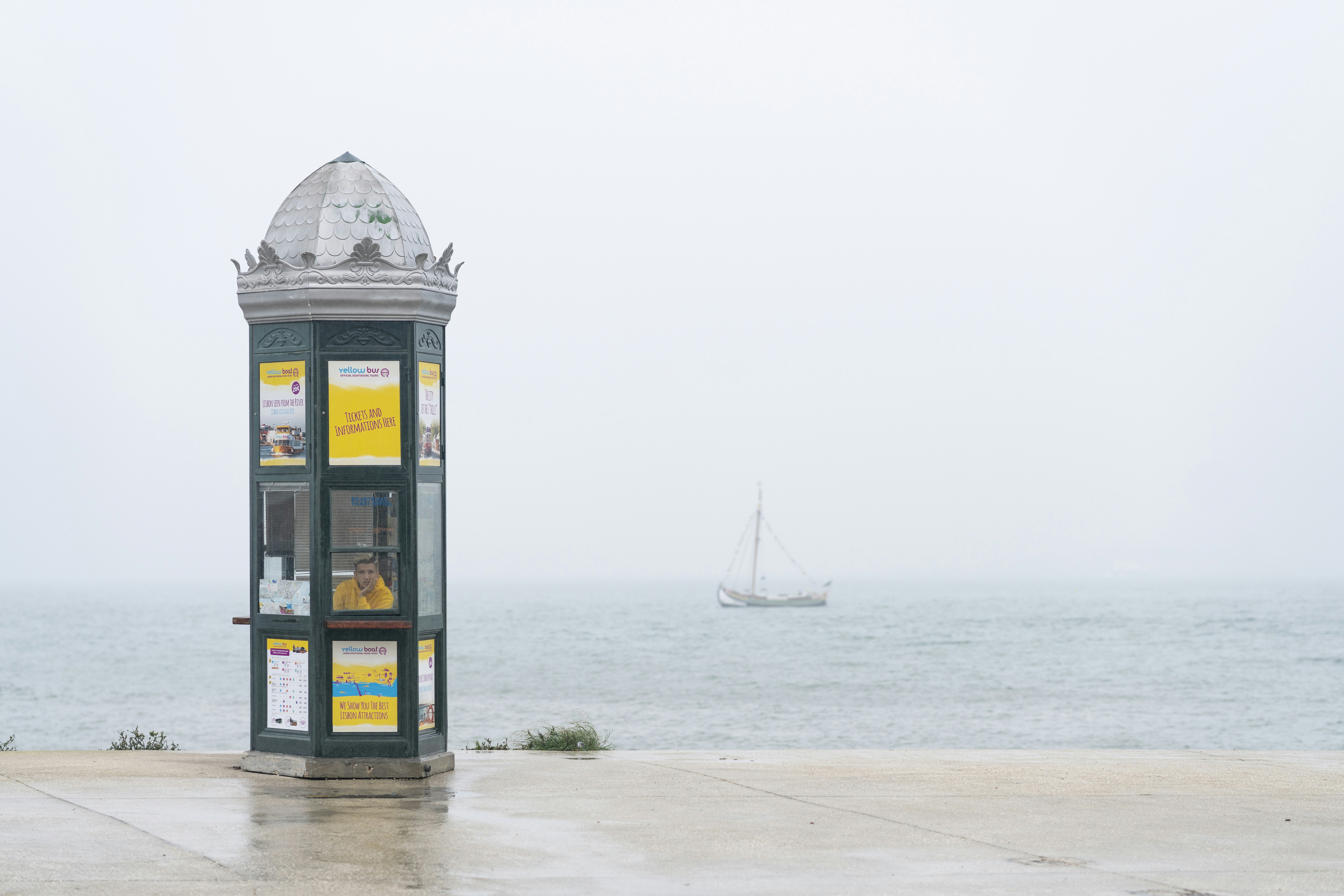 Beacon by the Sea: A Standalone Kiosk Watches Over the Quiet Pier