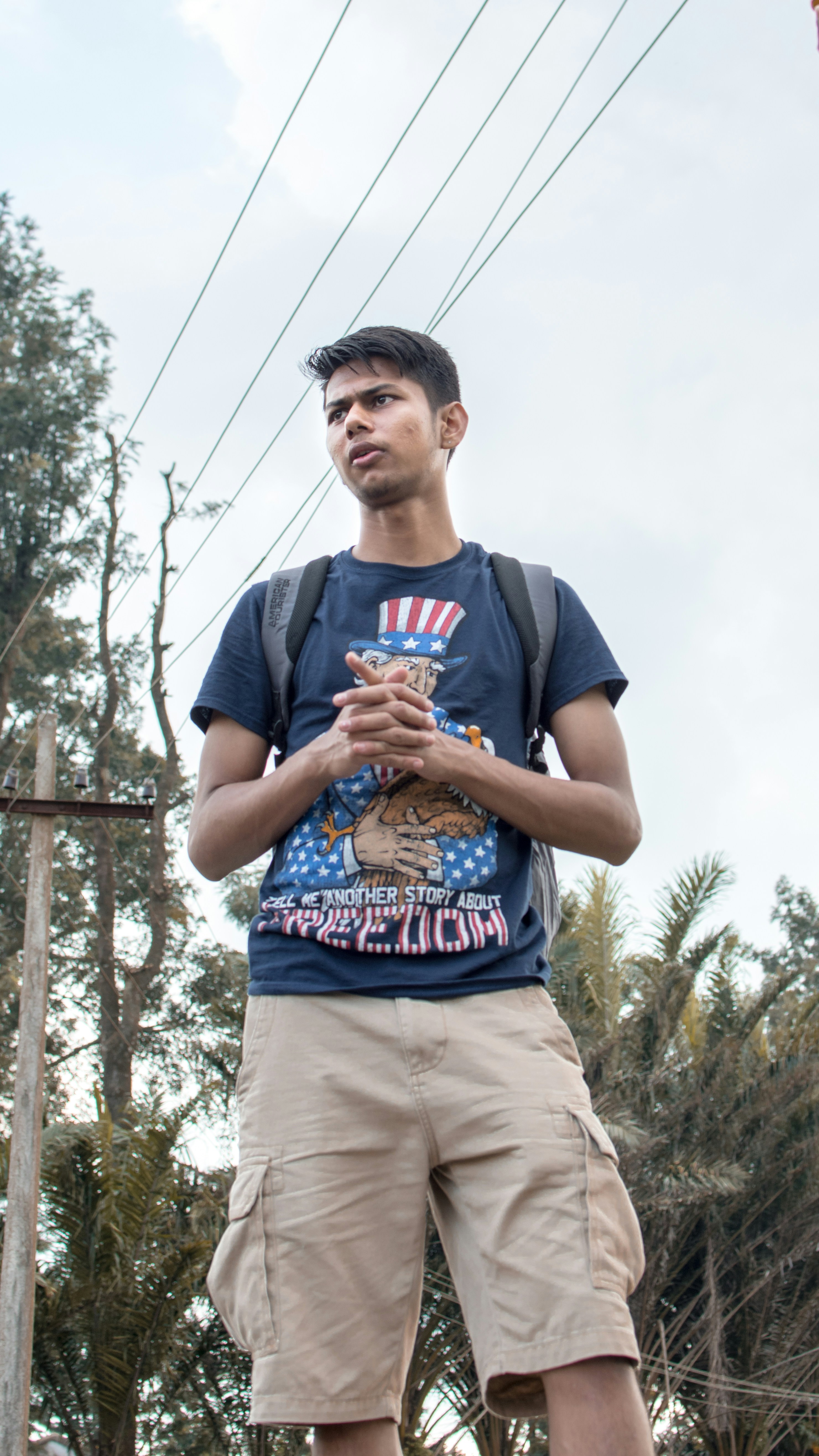Under the Cables: A Quiet Portrait of Confidence