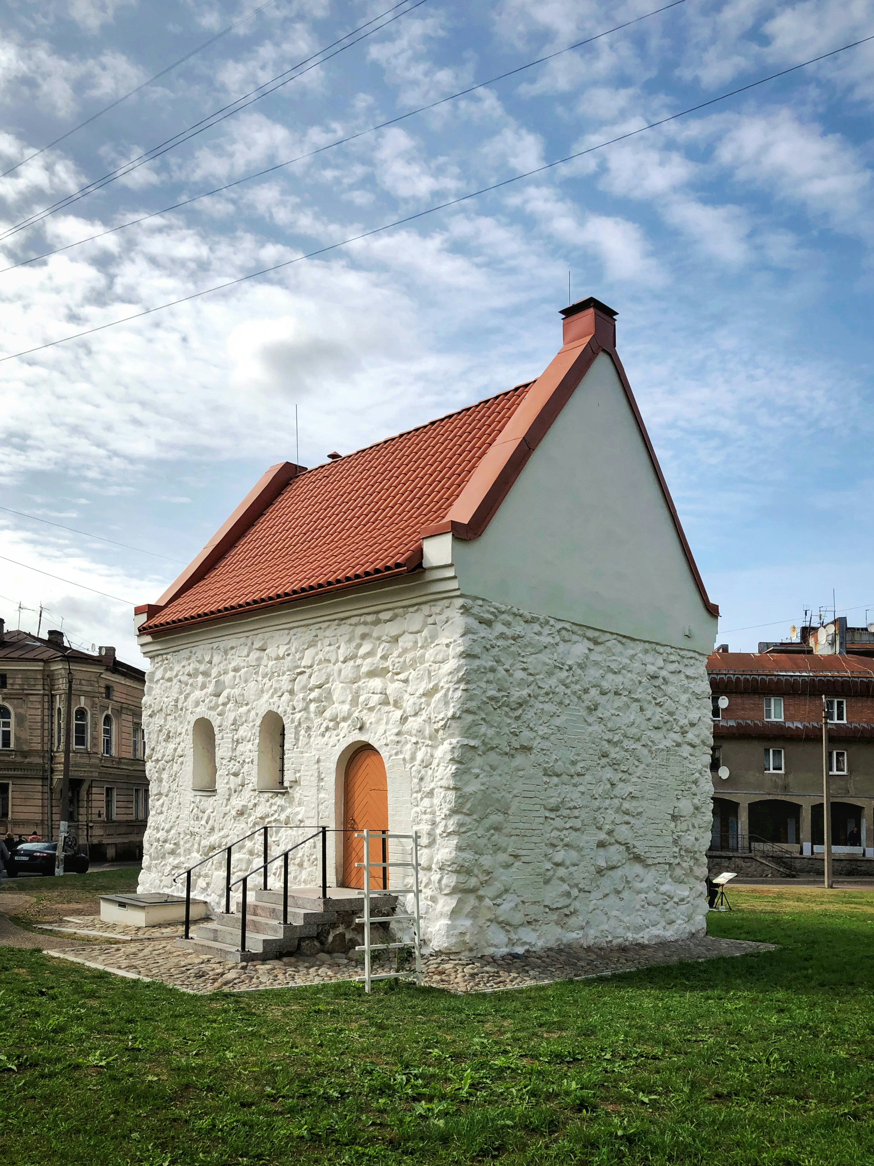 Little White Bastion in a Park: Stone House with a Terracotta Roof