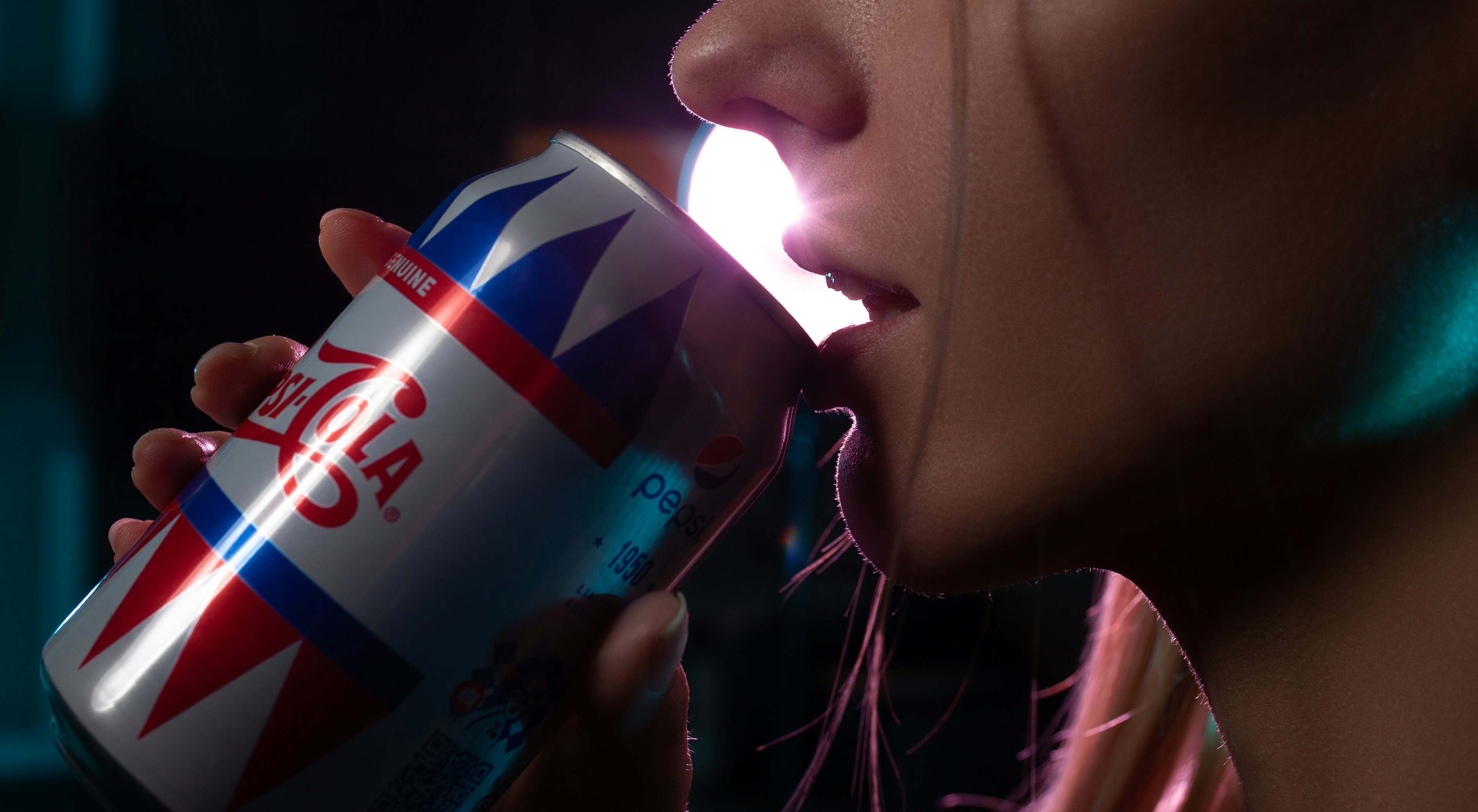 woman drinking Coca-Cola soda can