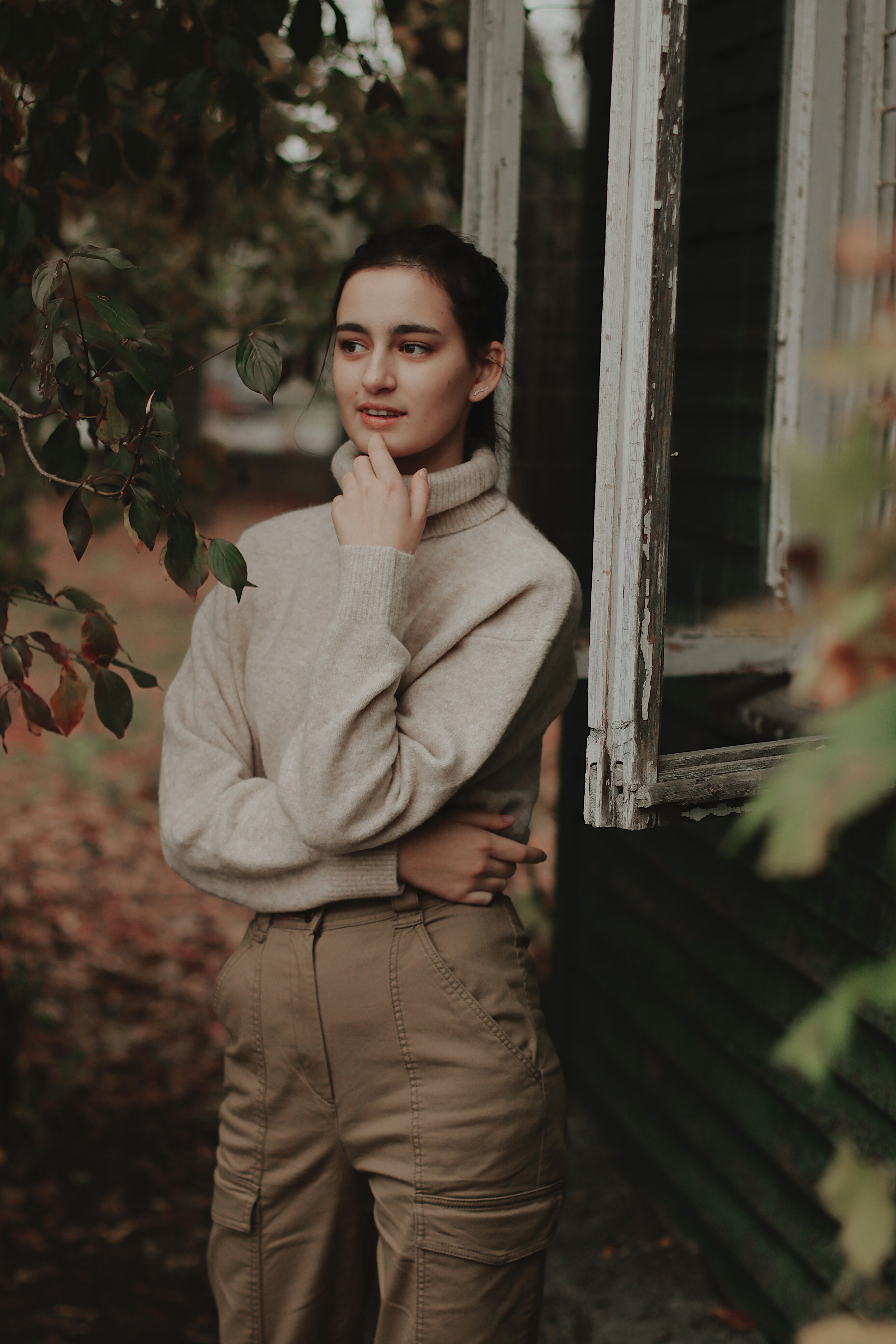 Woman standing beside window photo – Free Apparel Image on Unsplash