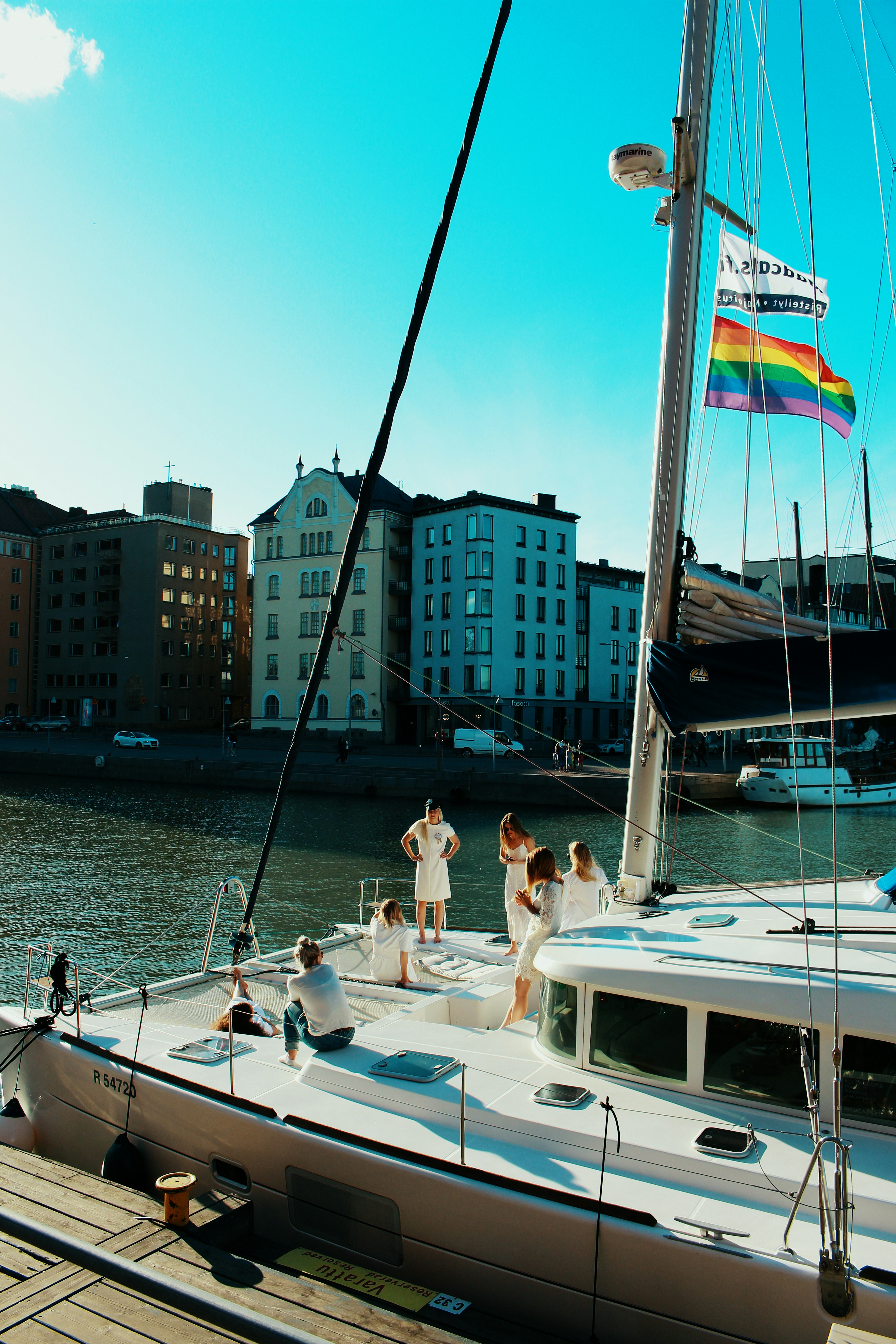 Rainbow Flag at the Helm: A Coastal Social Aboard a Modern Sloop