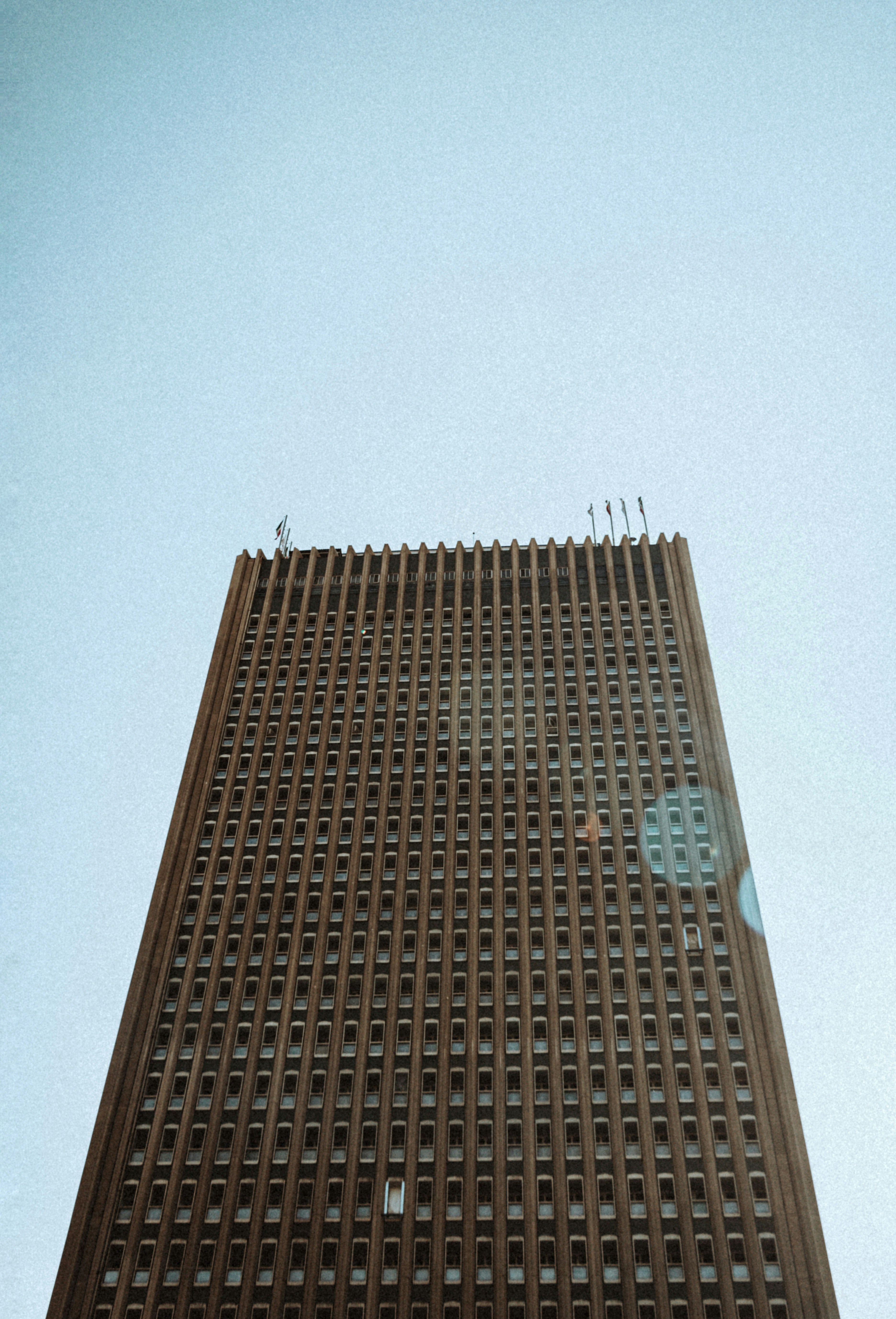 Gridline Ascent: A Brick Tower Reaching Skyward