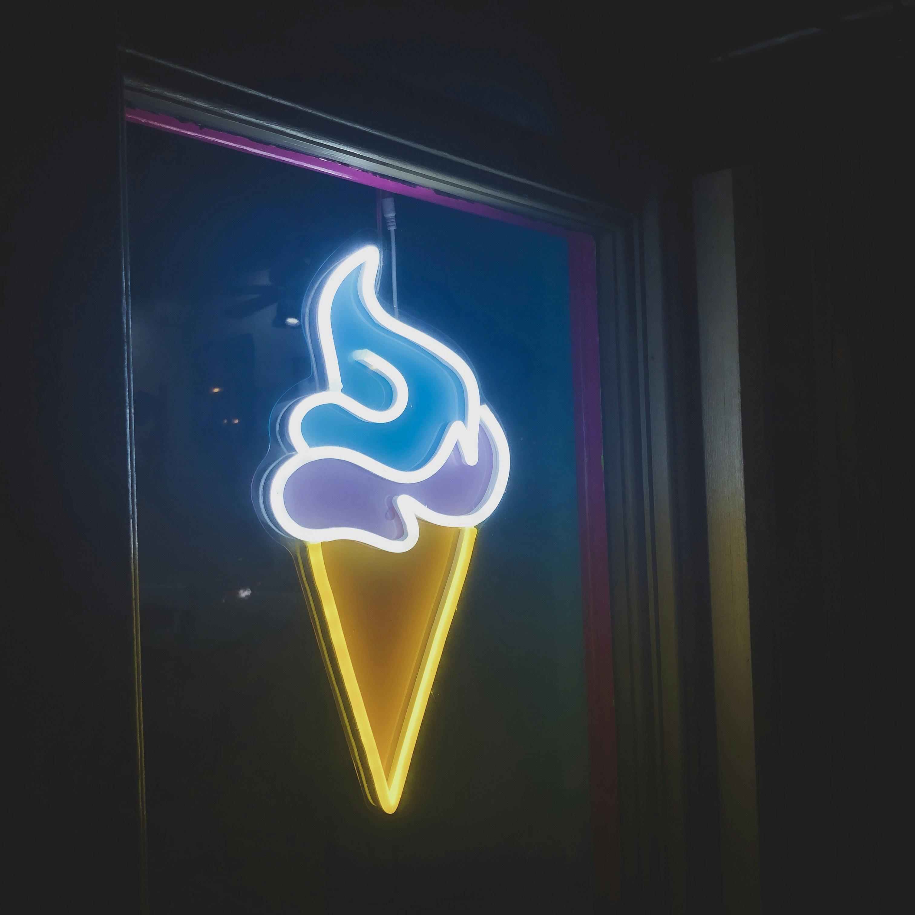 Neon Ice Cream Sign in Night Frame
