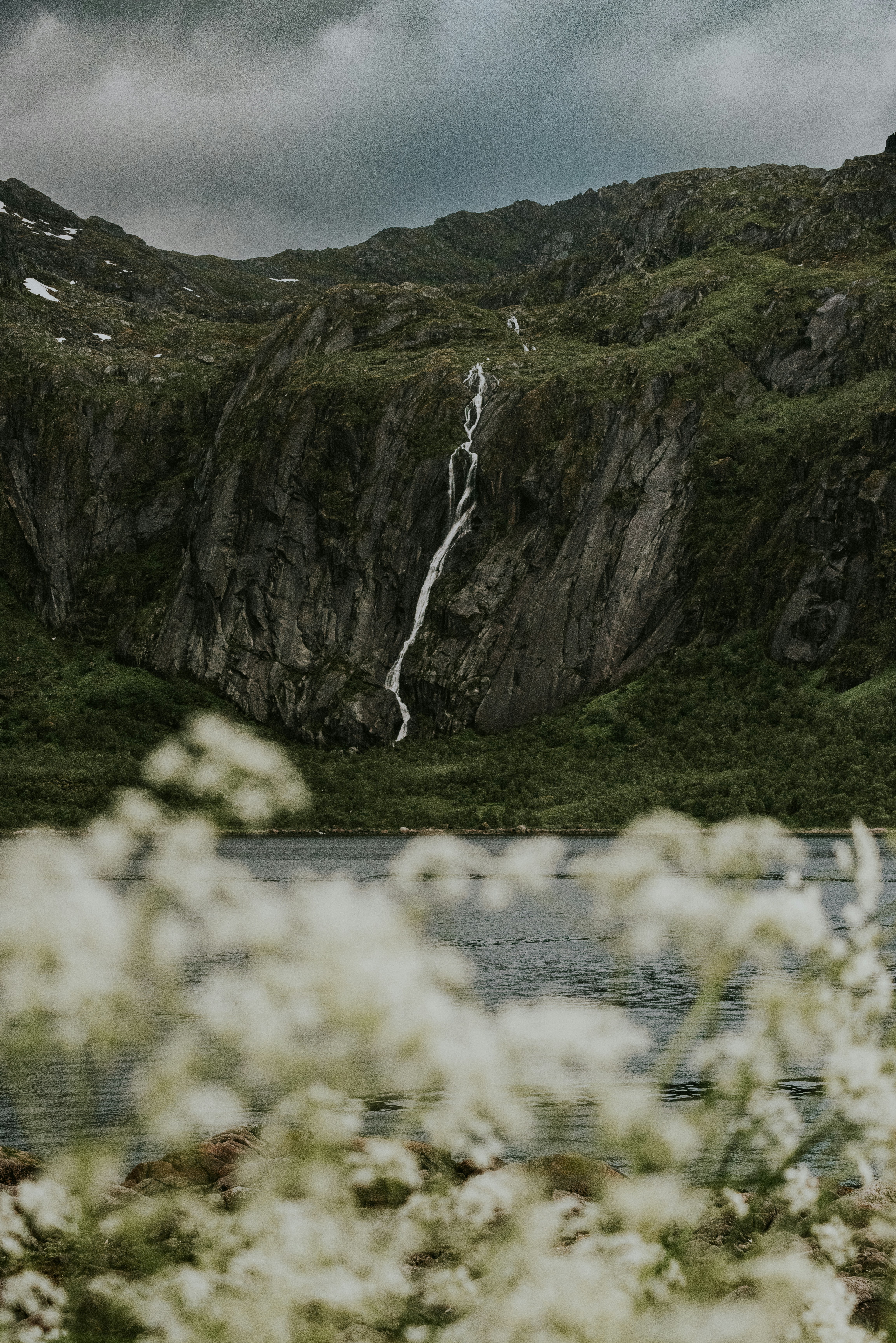 photography of waterfalls on mountain during daytime