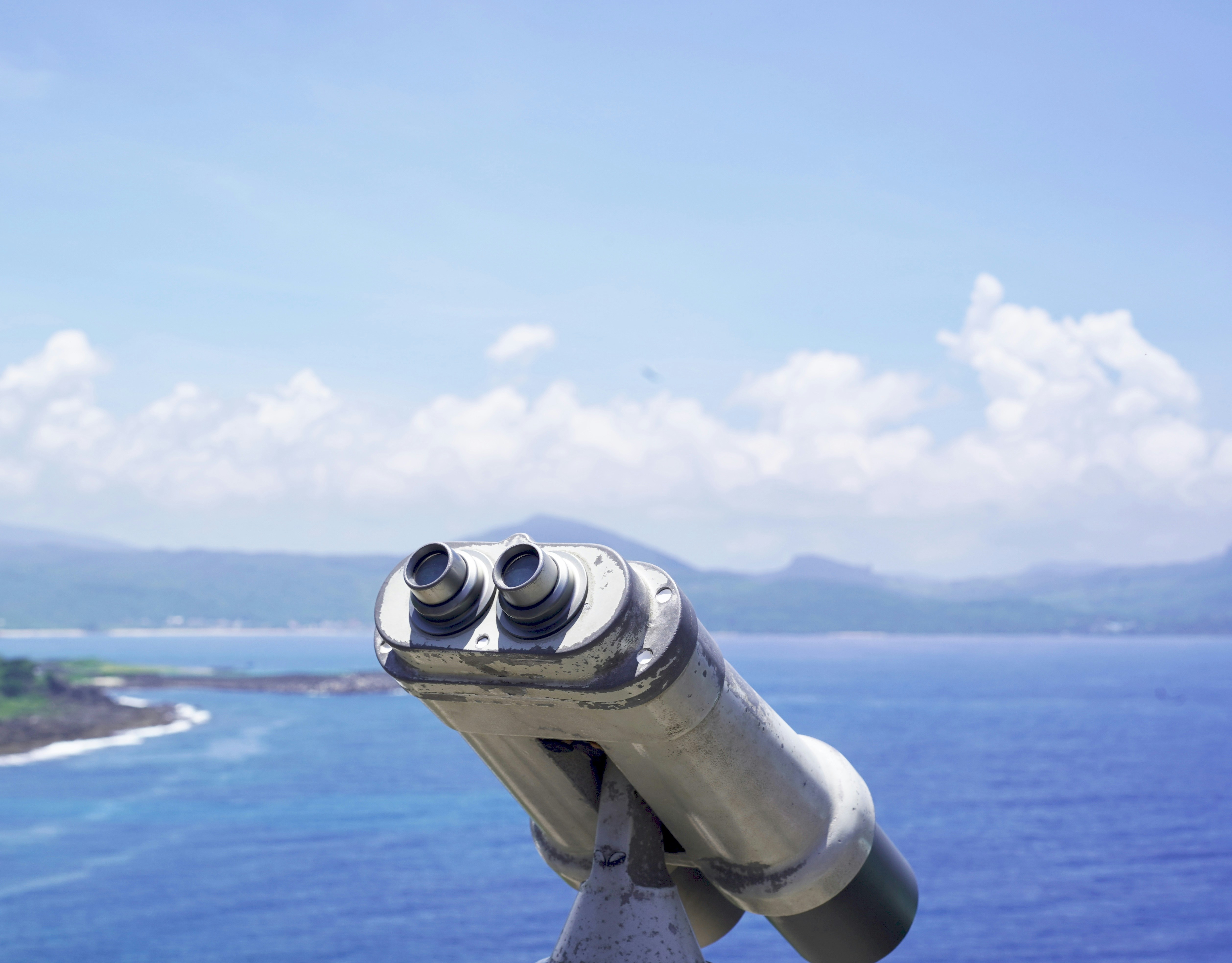 Weathered Seaside Viewfinder Extends a Quiet Blue Horizon