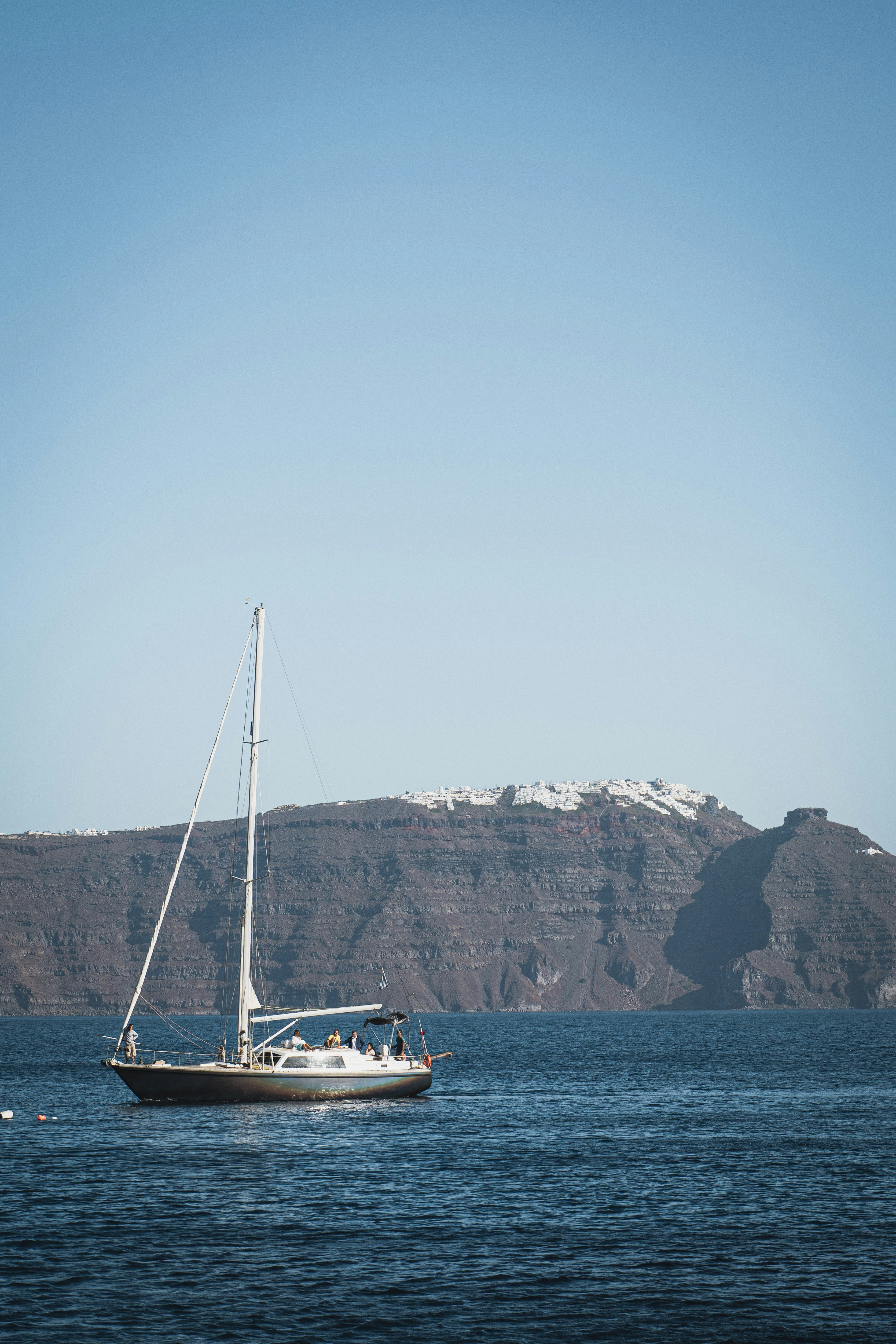 Sloop Drifting Past the White-Cliff Horizon