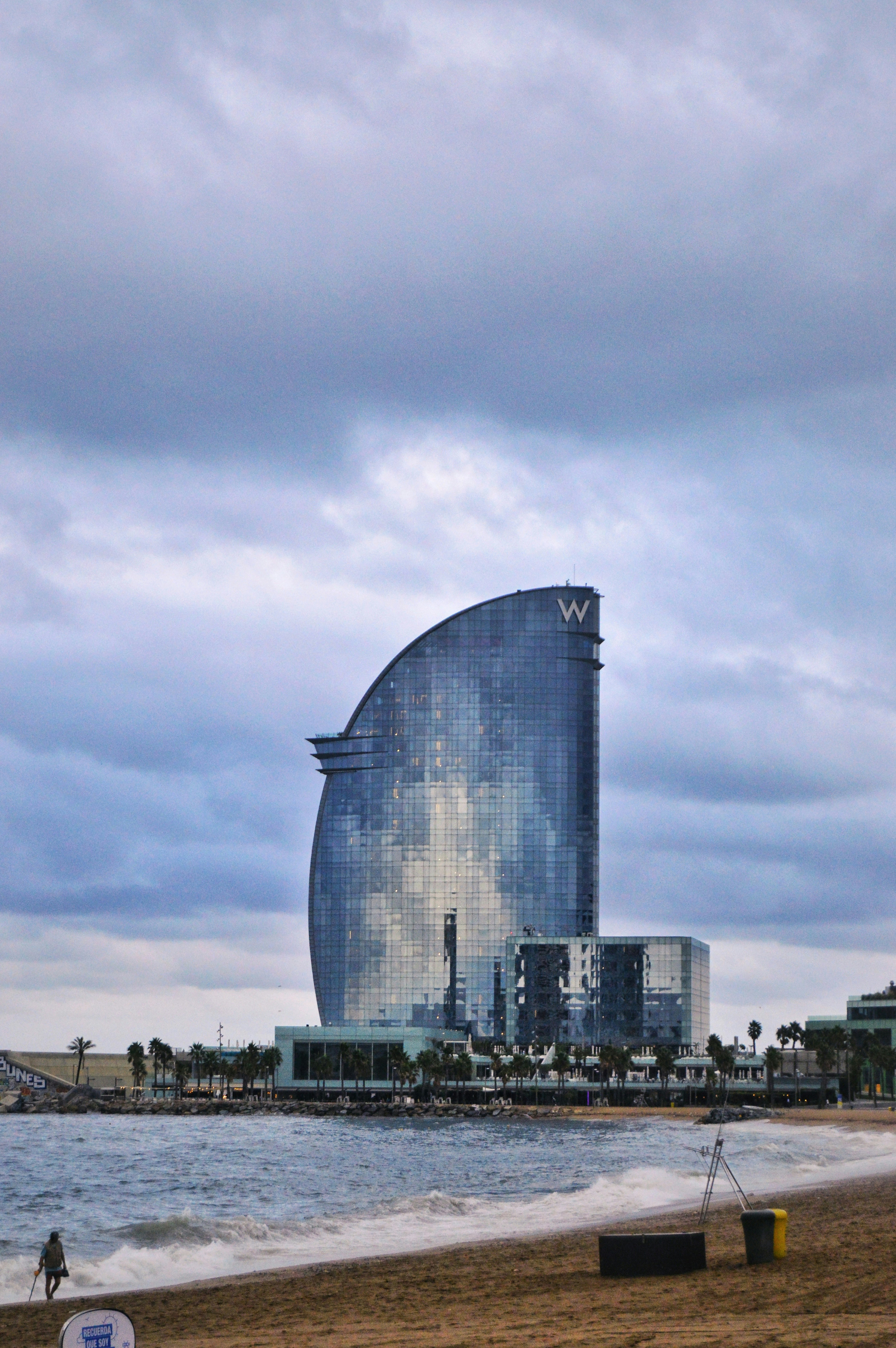 Waves at the W: Moderny Silhouette Against a Cloudy Sea