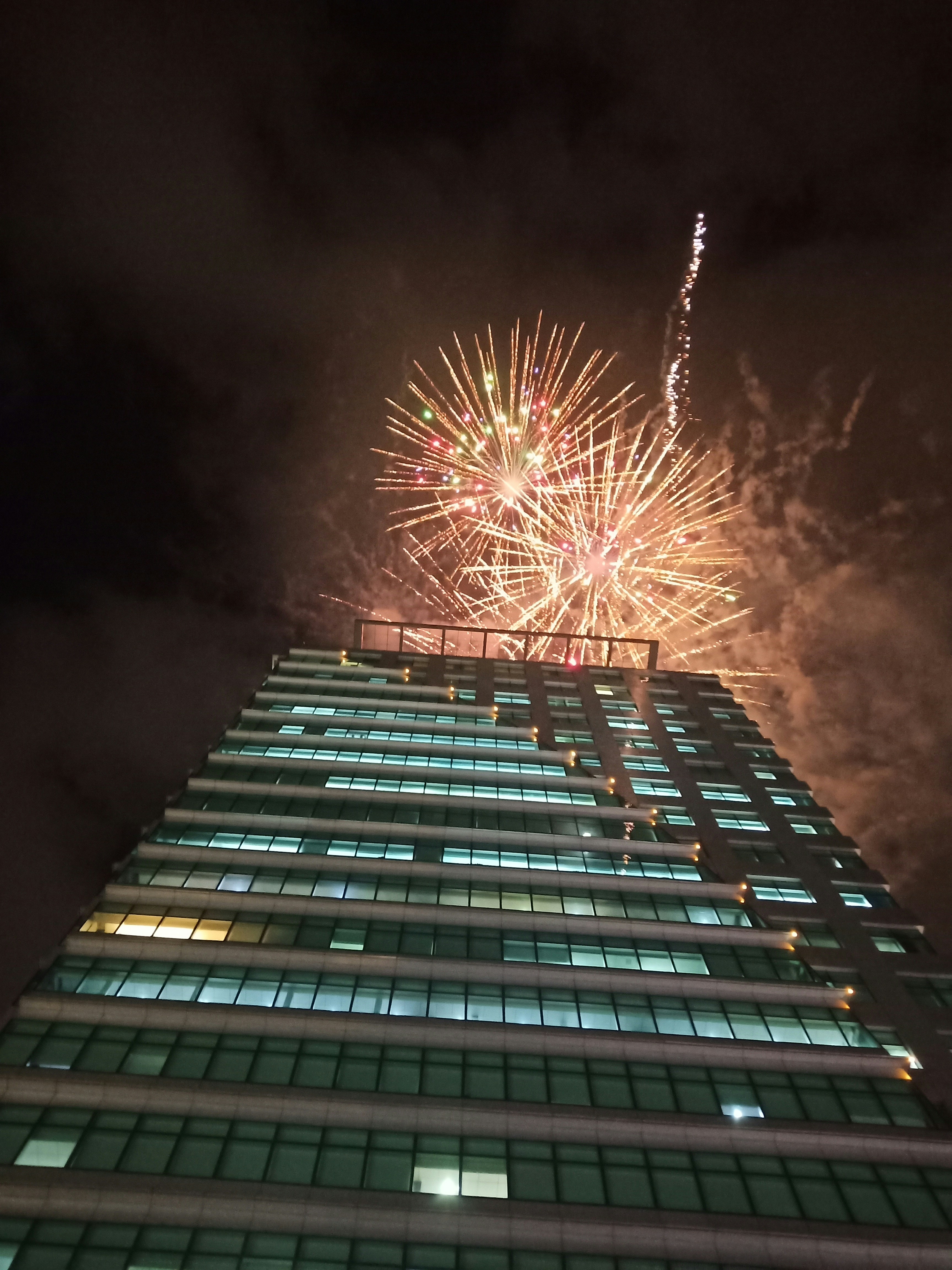 High-rise building with fireworks photo – Free Brown Image on Unsplash