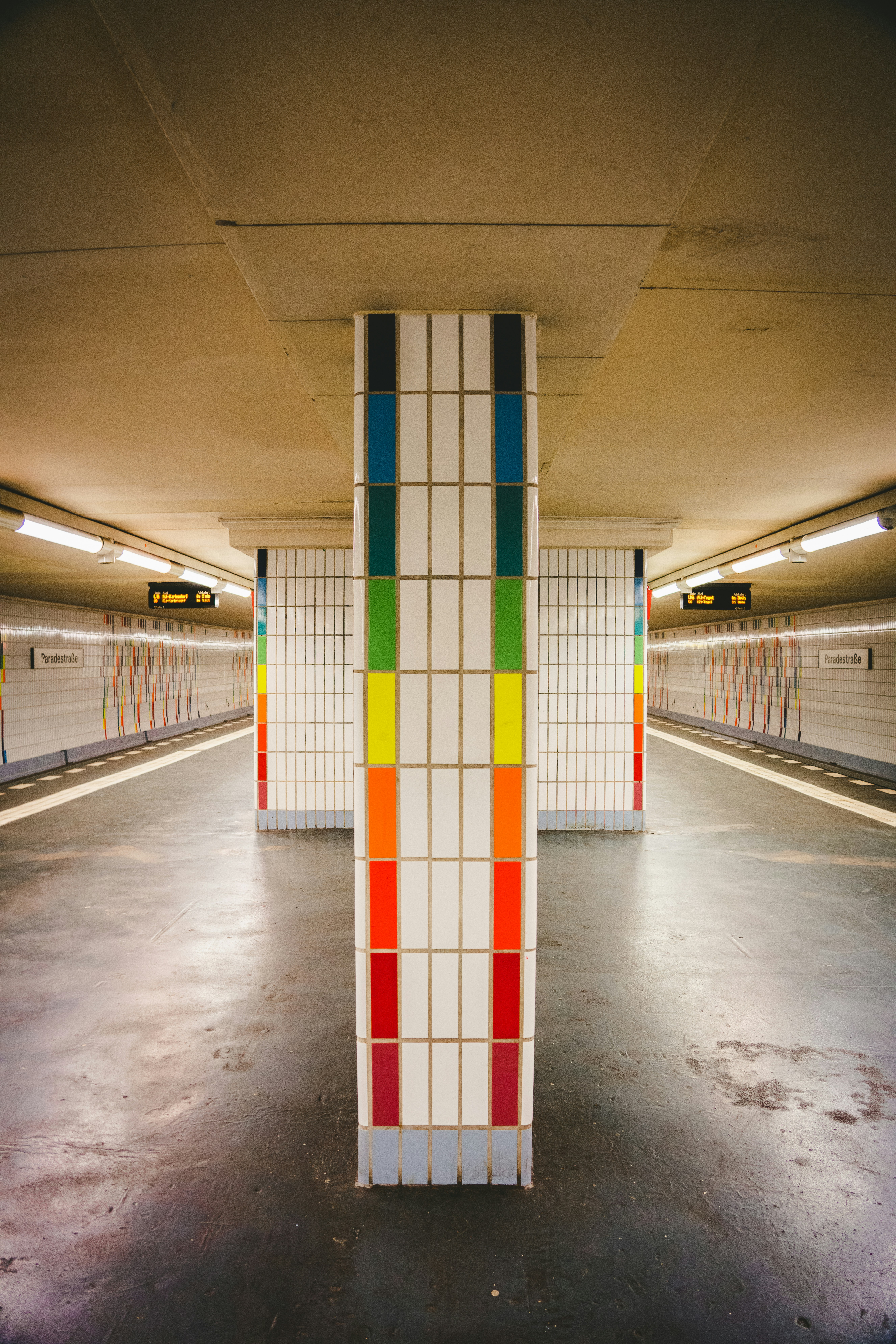 Colorful Pillars in a Quiet Subway: Symmetry Under Fluorescent Light
