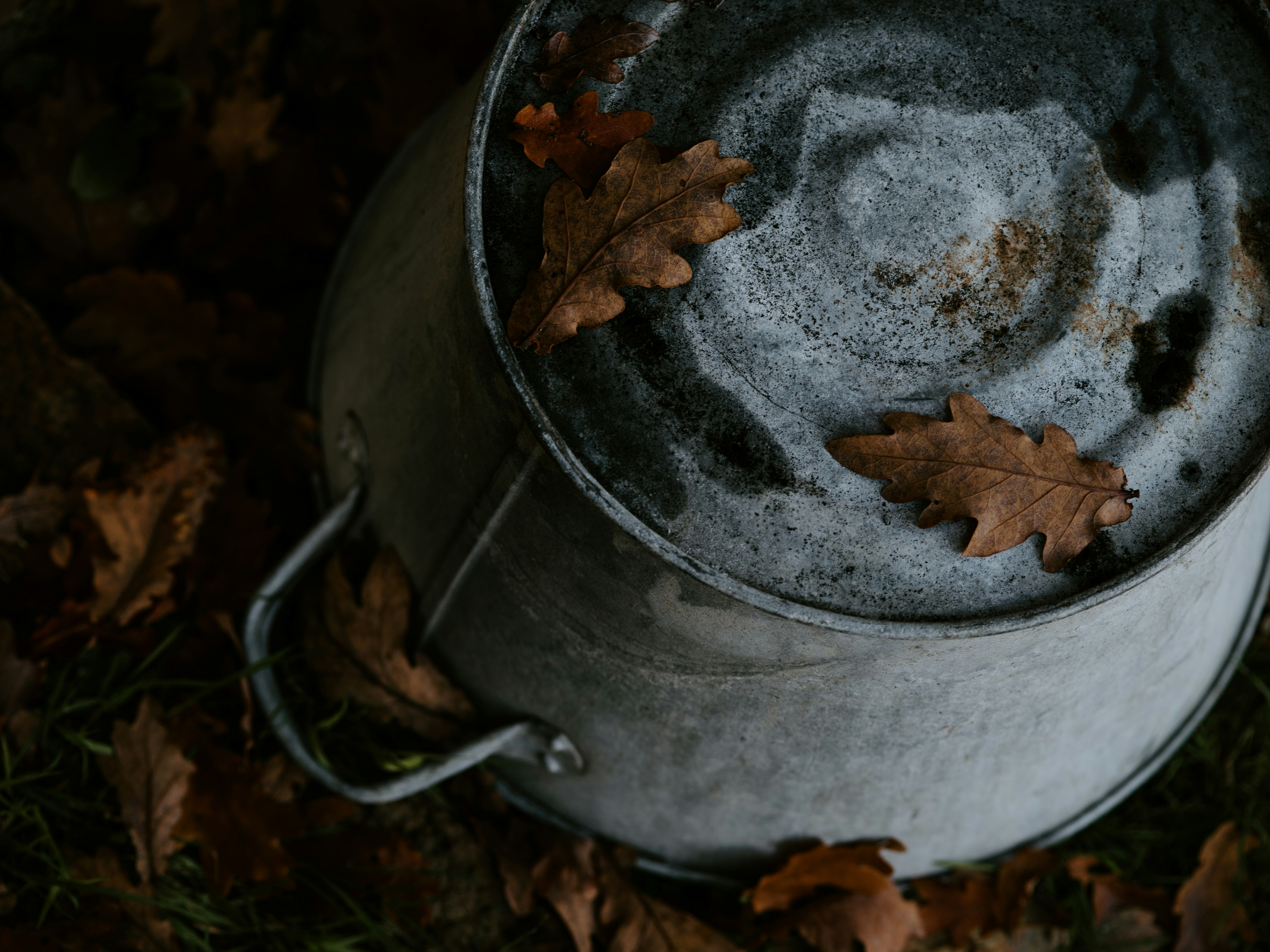 Upside down gray metal pot on ground photo – Free Grey Image on Unsplash