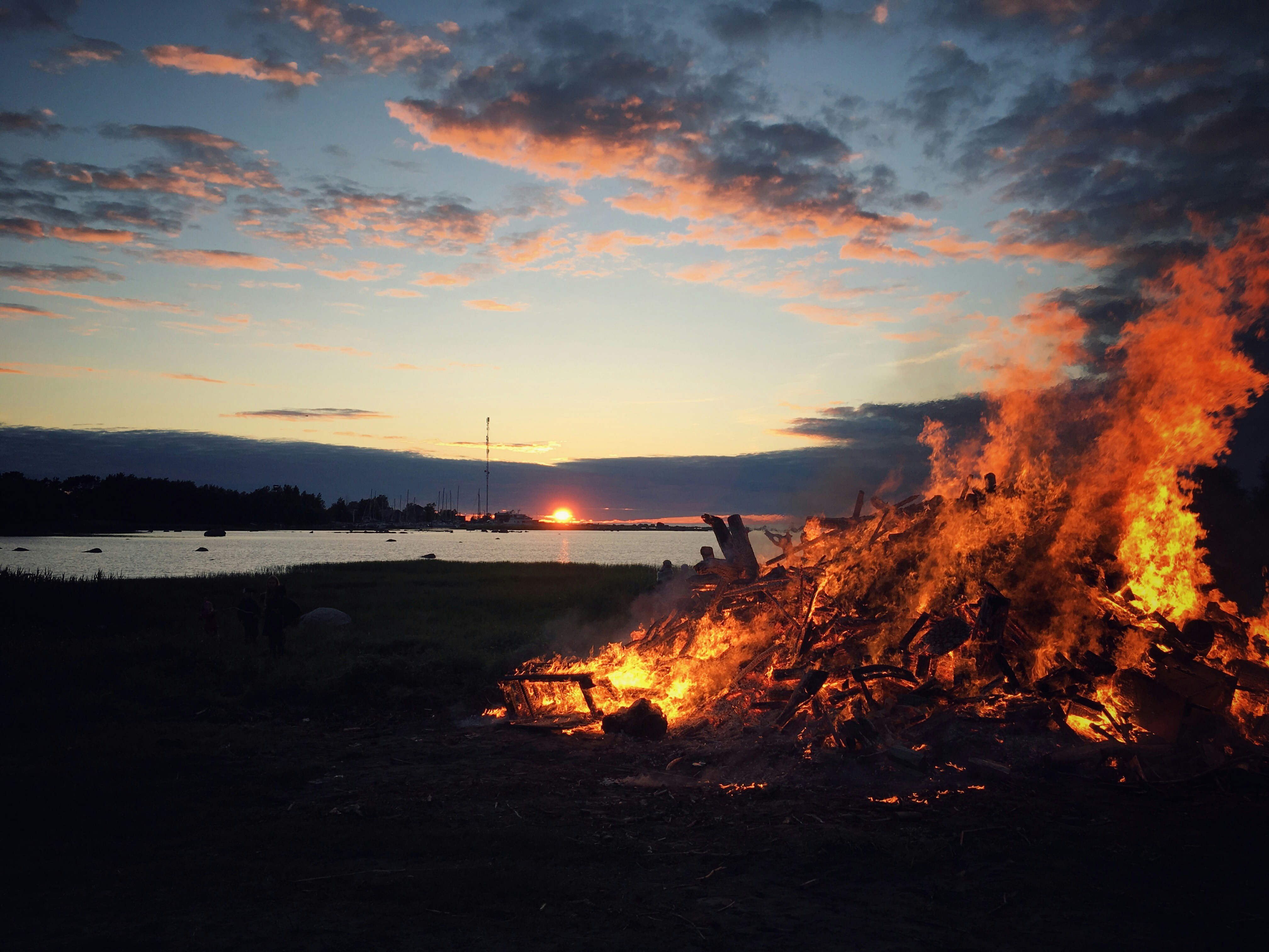 View photography of fire near lake during dawn photo – Free Fire Image ...