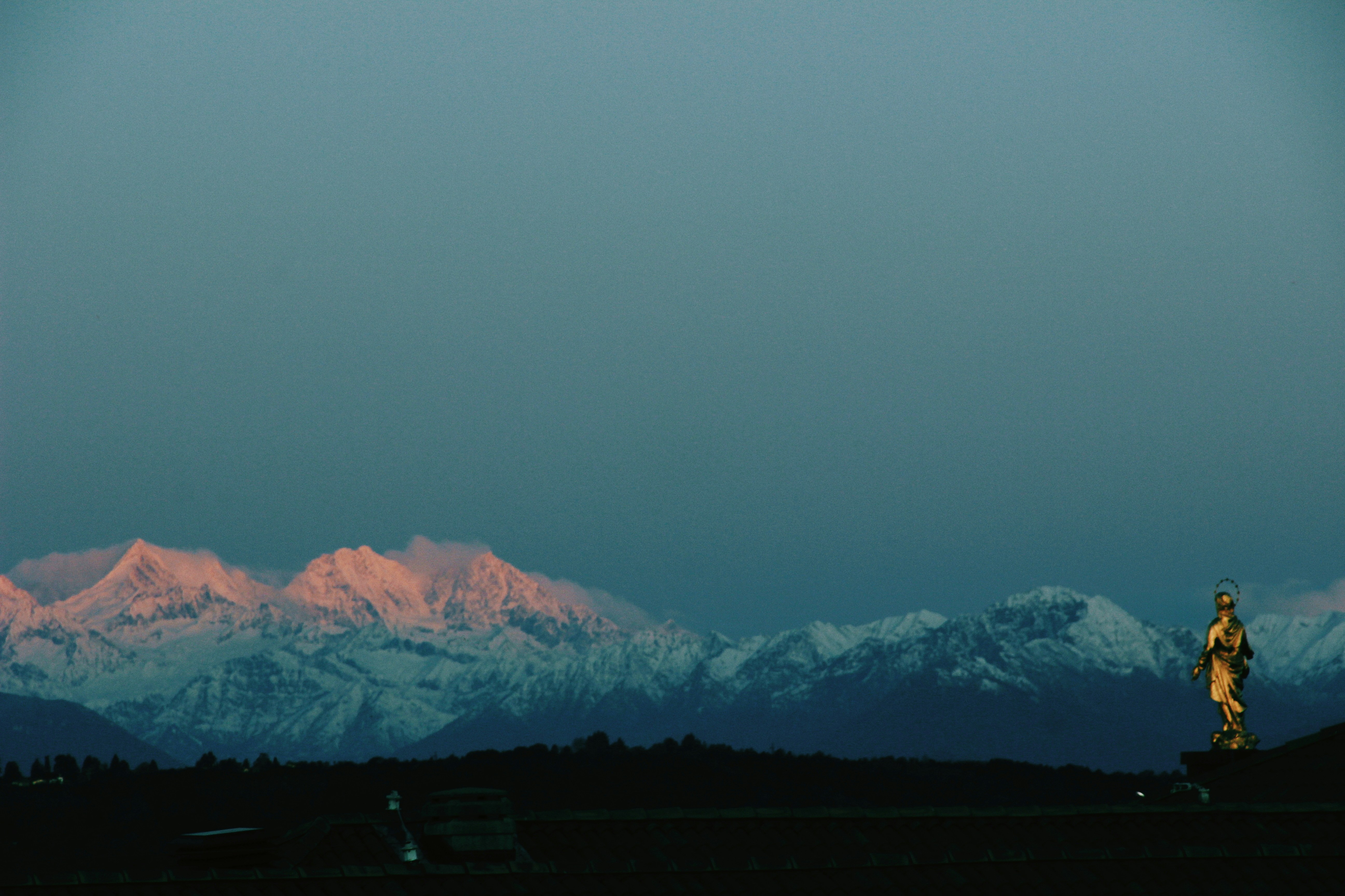 Gold human statue near glacier mountains during day photo – Free Grey ...