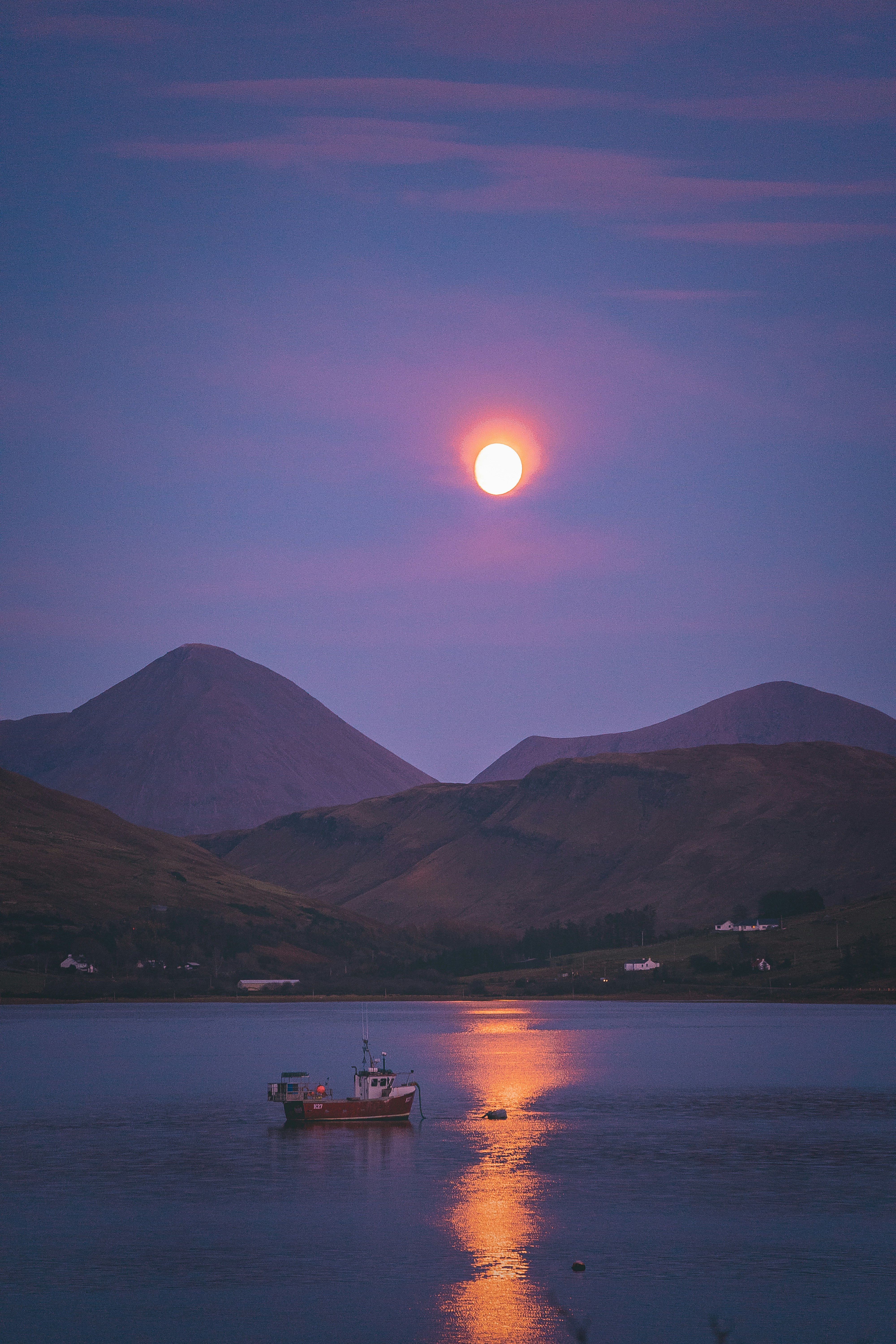 Moonlit Fjord: Moonrise Over Quiet Hills and a Sailing Vessel