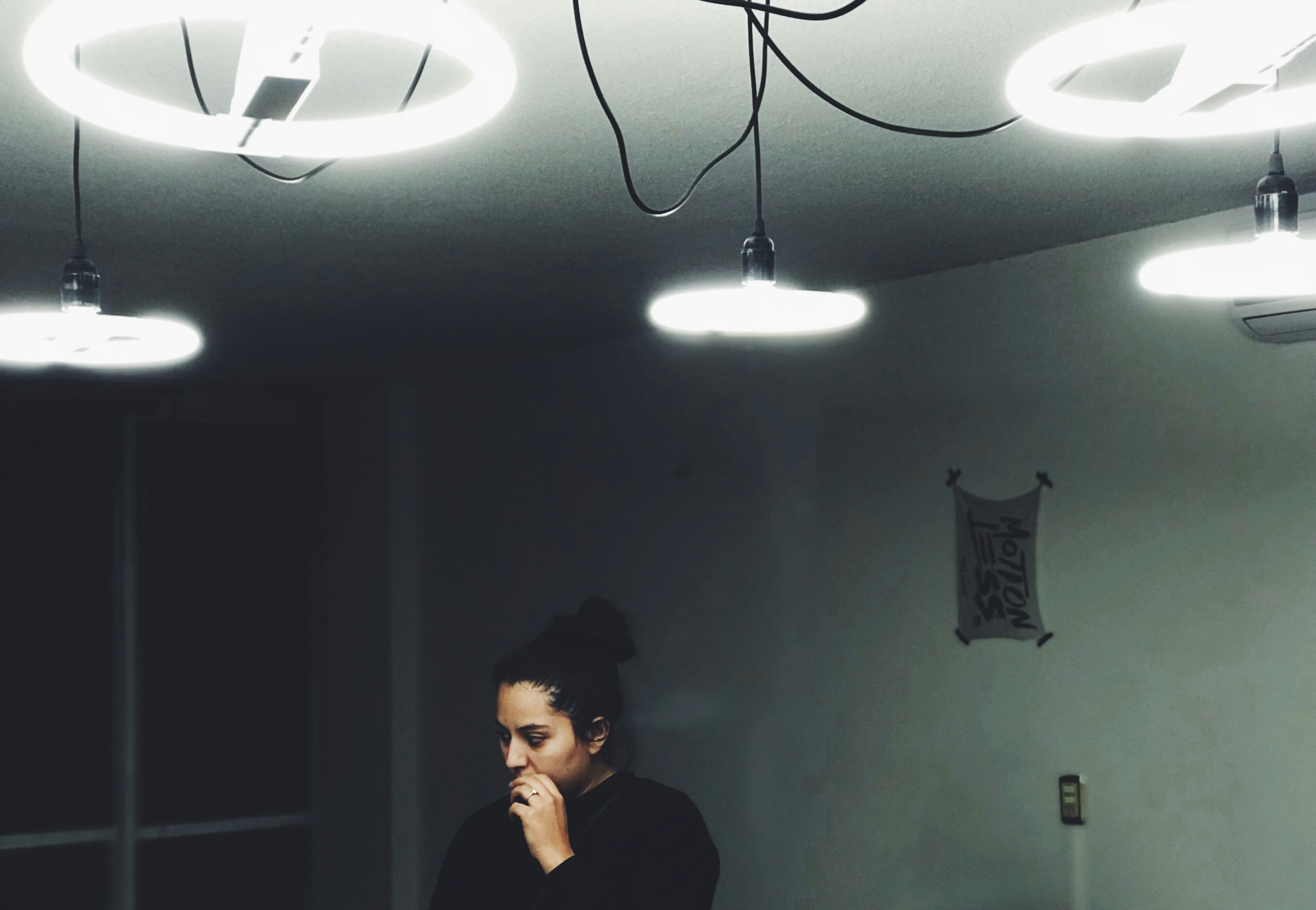Quiet Contemplation Under Industrial Glow