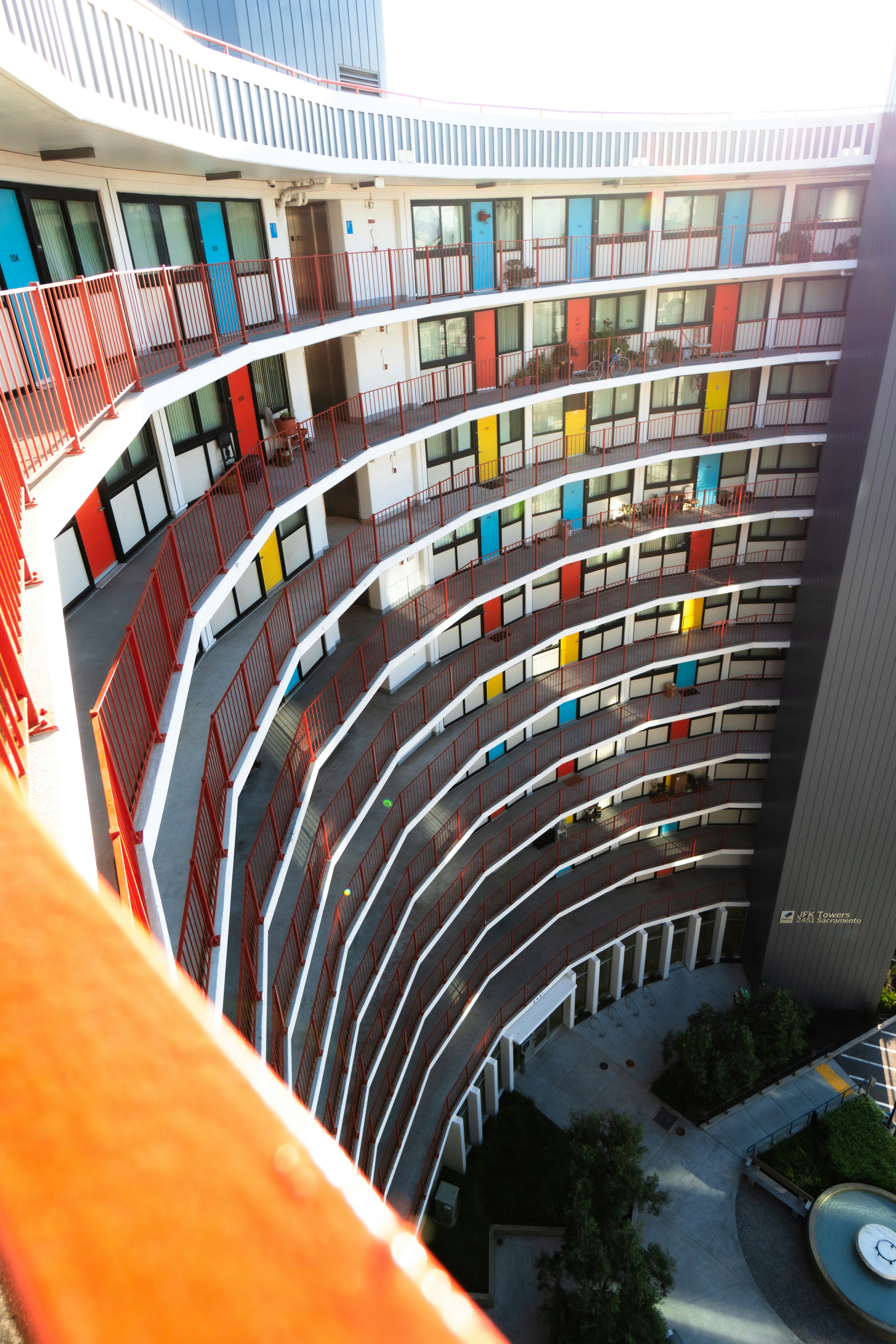Colorful Arcade of Balconies: A Spiral Courtyard Vista