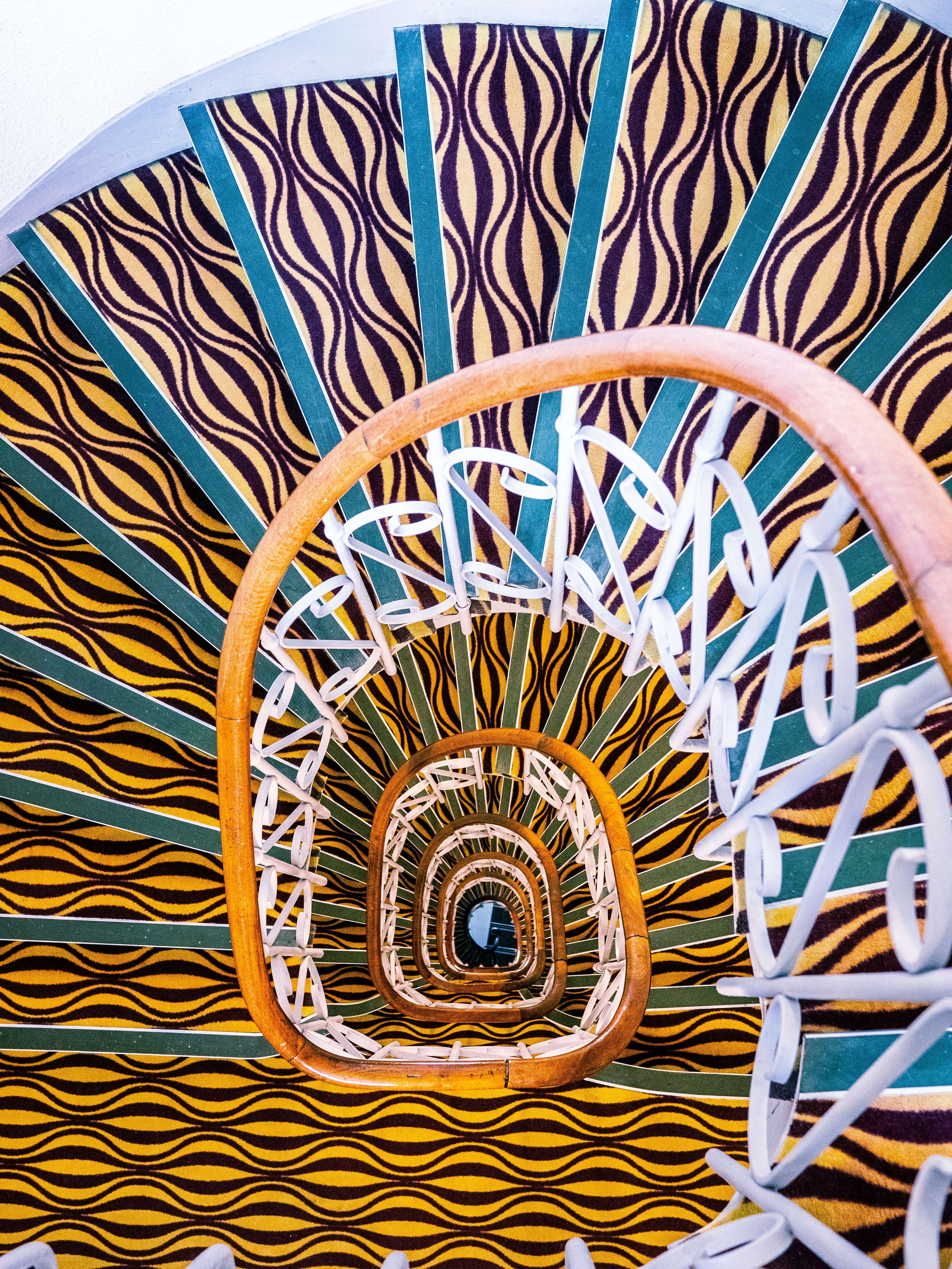 Spiral Descent: A Vivid Staircase Through the Eye of the Hoop