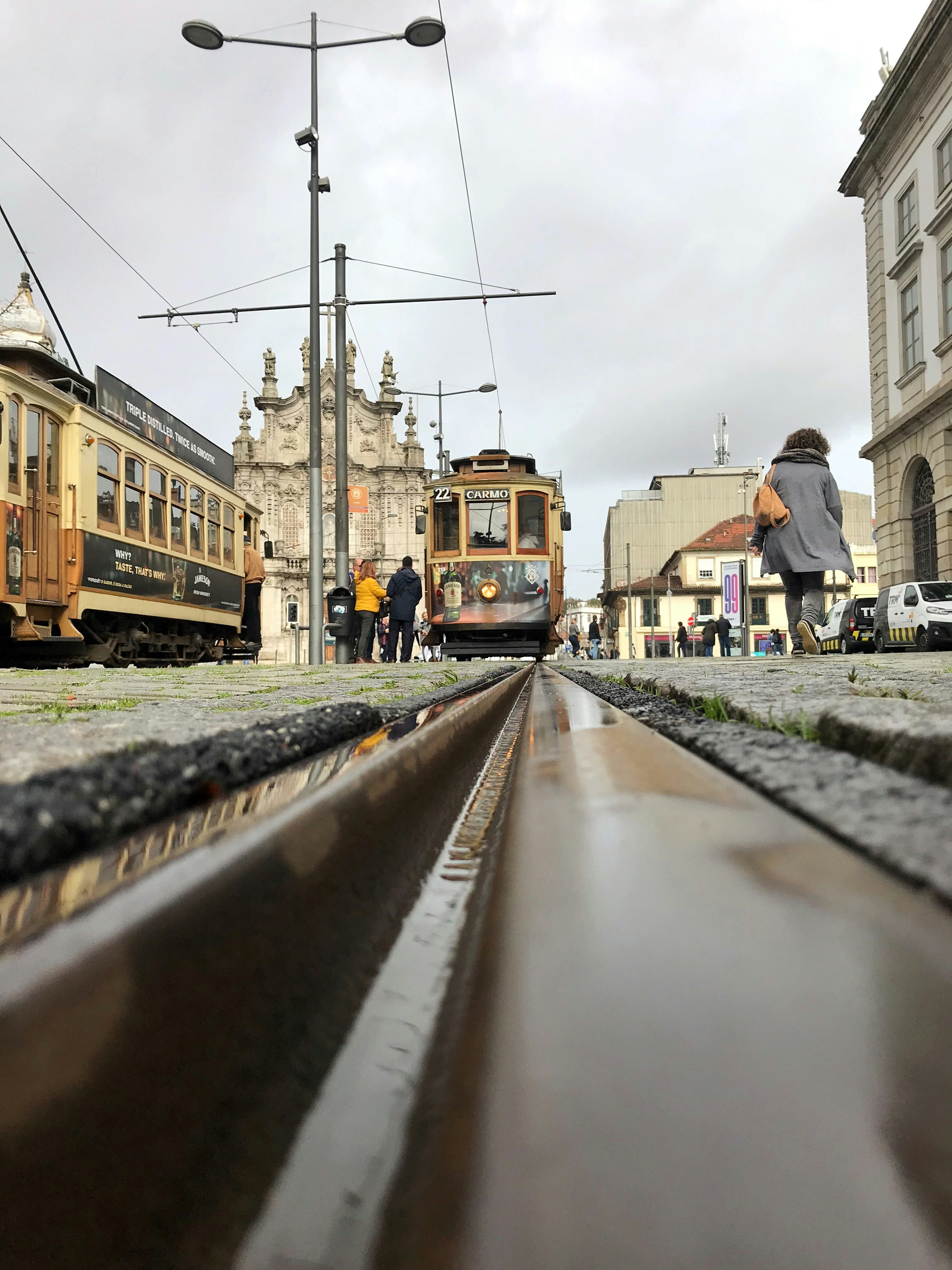 Convergence of Rails: Trams and Pedestrians in a Cobblestone City Square